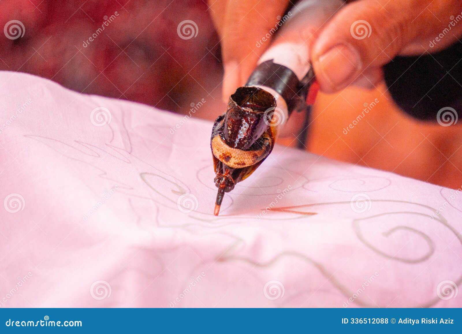 Crafter is Making Batik Patterns on Fabric Using a Tool Called a ...