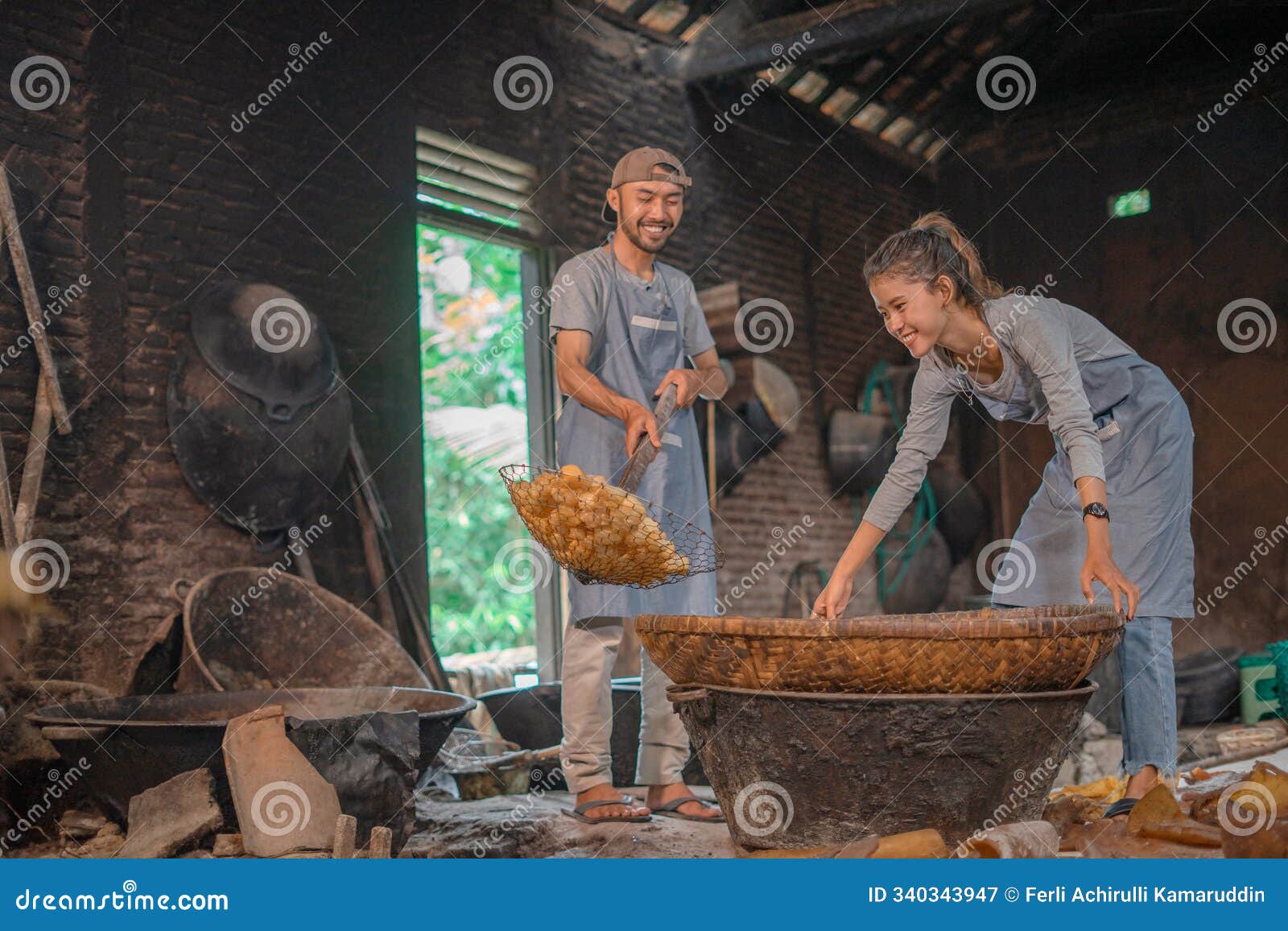 A Craftsman and an Artisan Collaborate Together in a Traditional ...