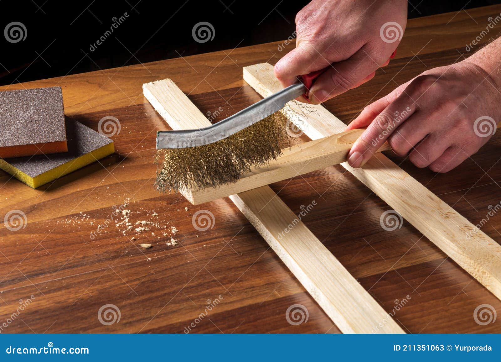 The Craftsman Cleans the Wood Plank with an Abrasive Tool. Builder ...