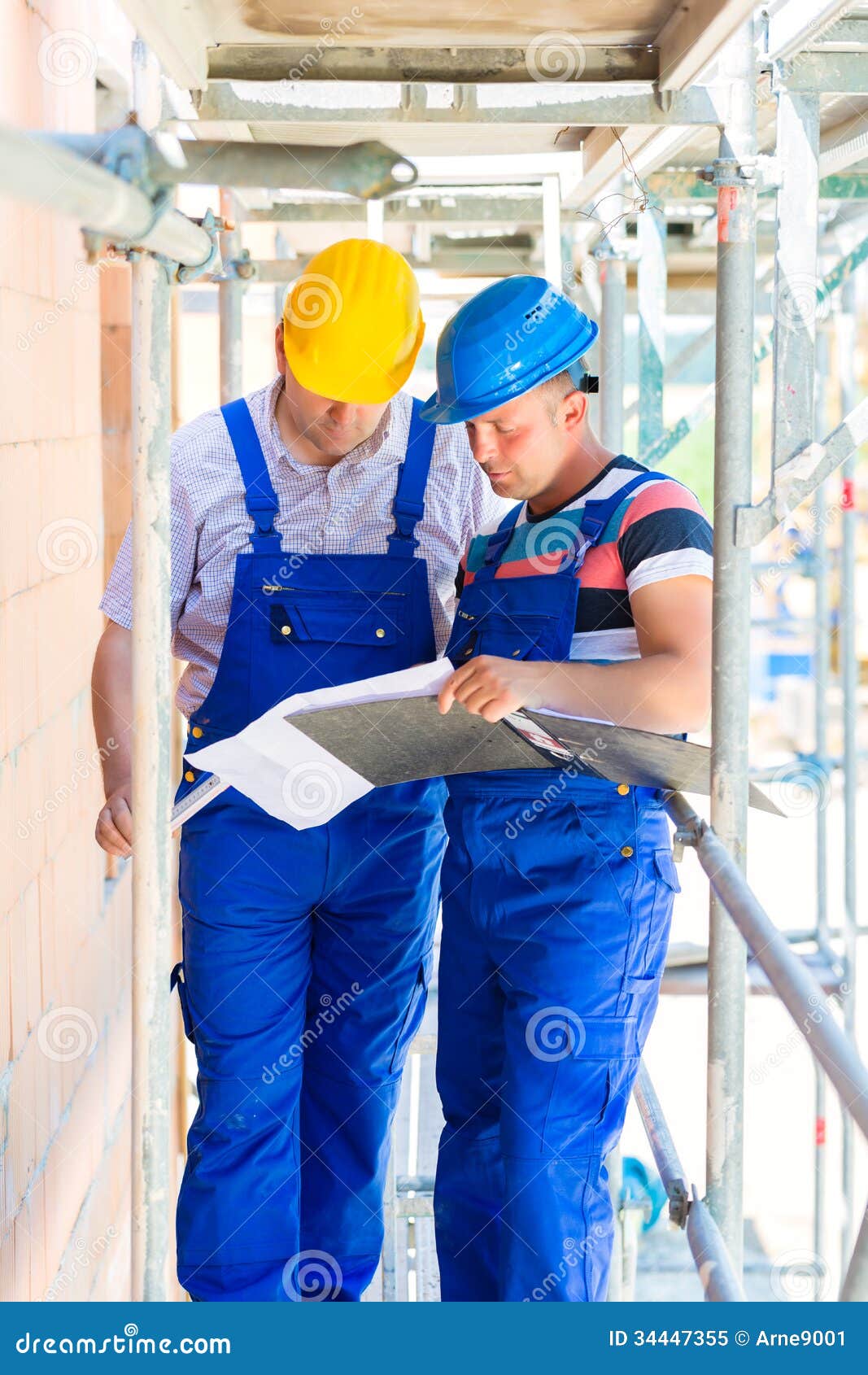 Craftsman Controlling Building Site or Construction Plans Stock Image ...