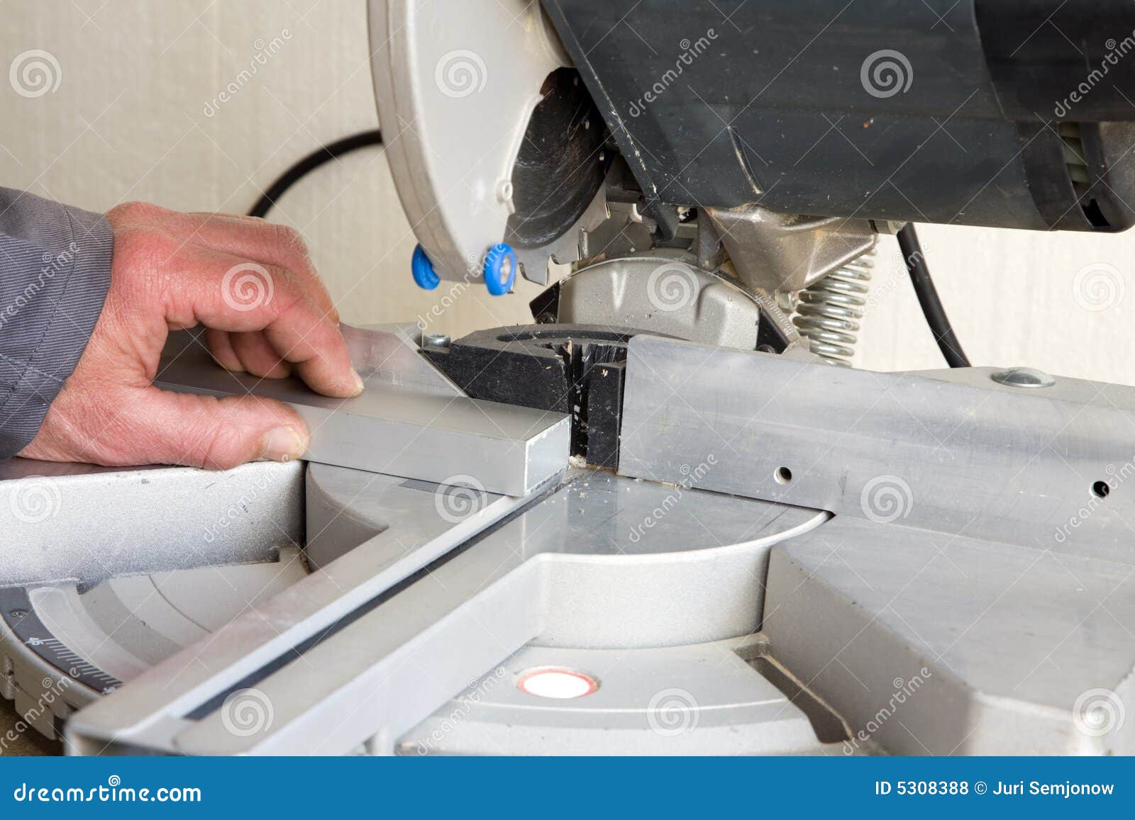 Craftsman Cutting a Piece of Aluminium. Stock Photo - Image of ...