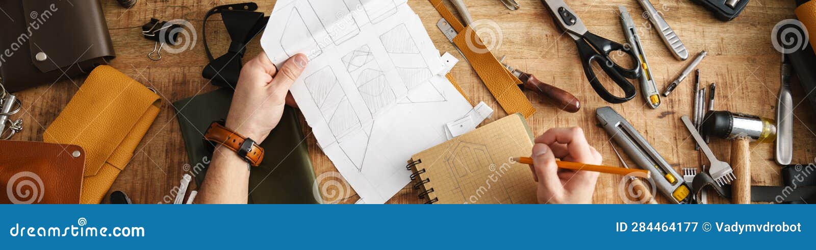 Craftsman Drawing while Working with Leather in Workshop Stock Image ...