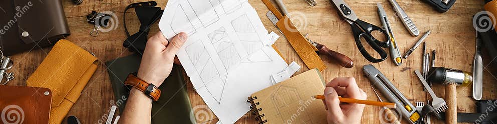 Craftsman Drawing while Working with Leather in Workshop Stock Image ...