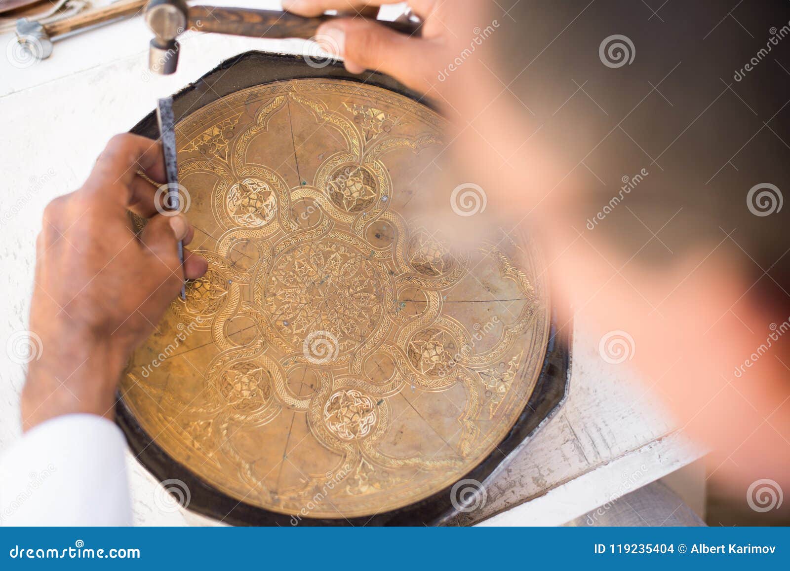 Chaser of copper at work stock photo. Image of bronze - 119235404