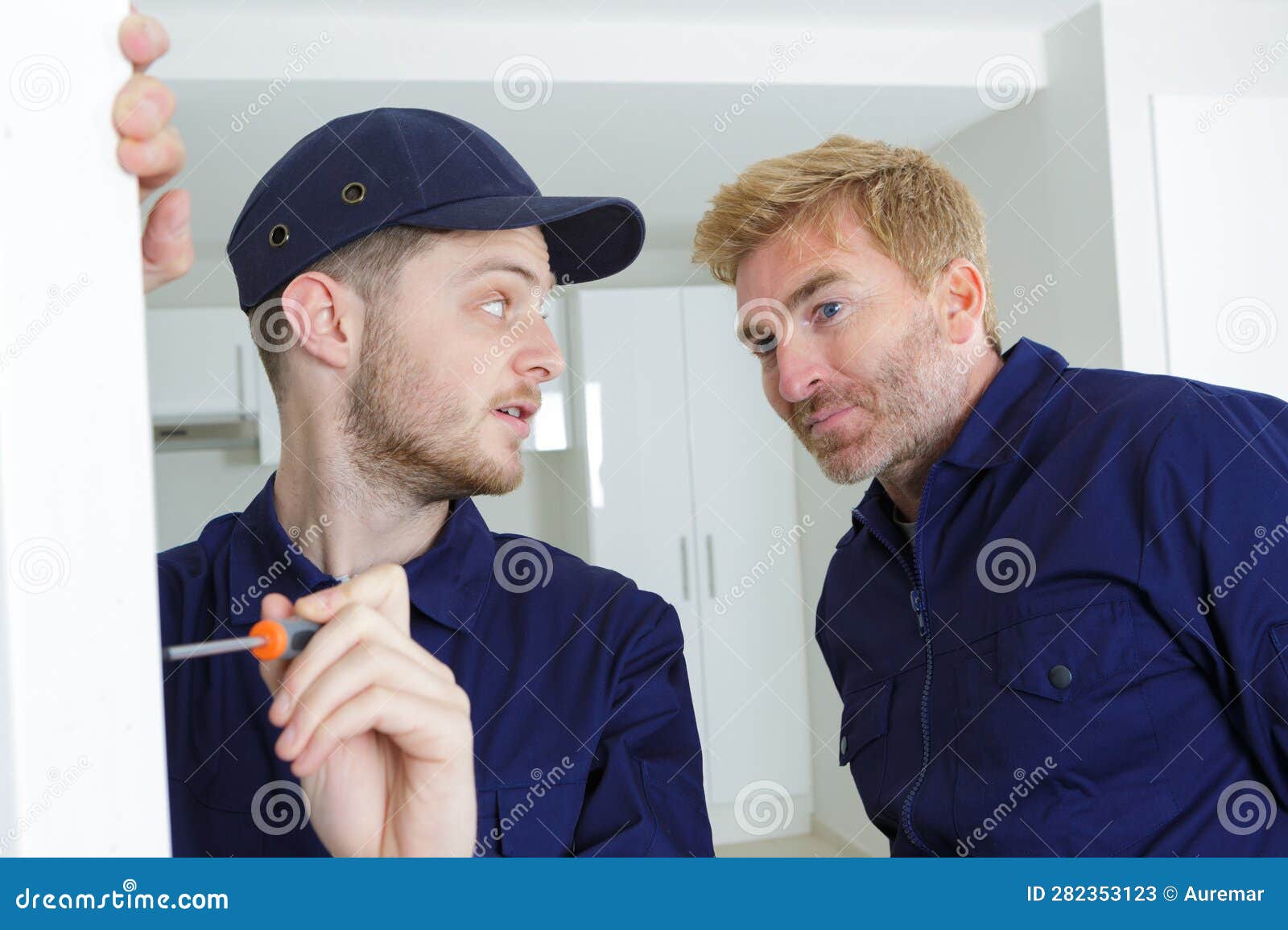 Craftsman Kitchen Carpenter Workers at Kitchen Furniture Set ...