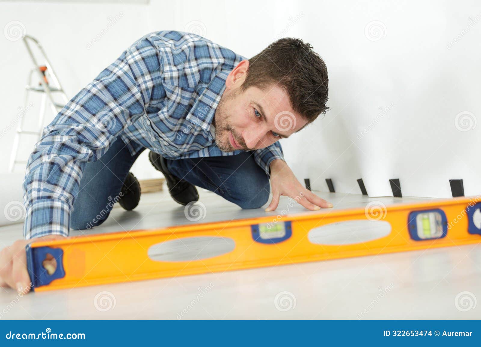 Craftsman Measuring Floor Level Stock Photo - Image of wooden, level ...