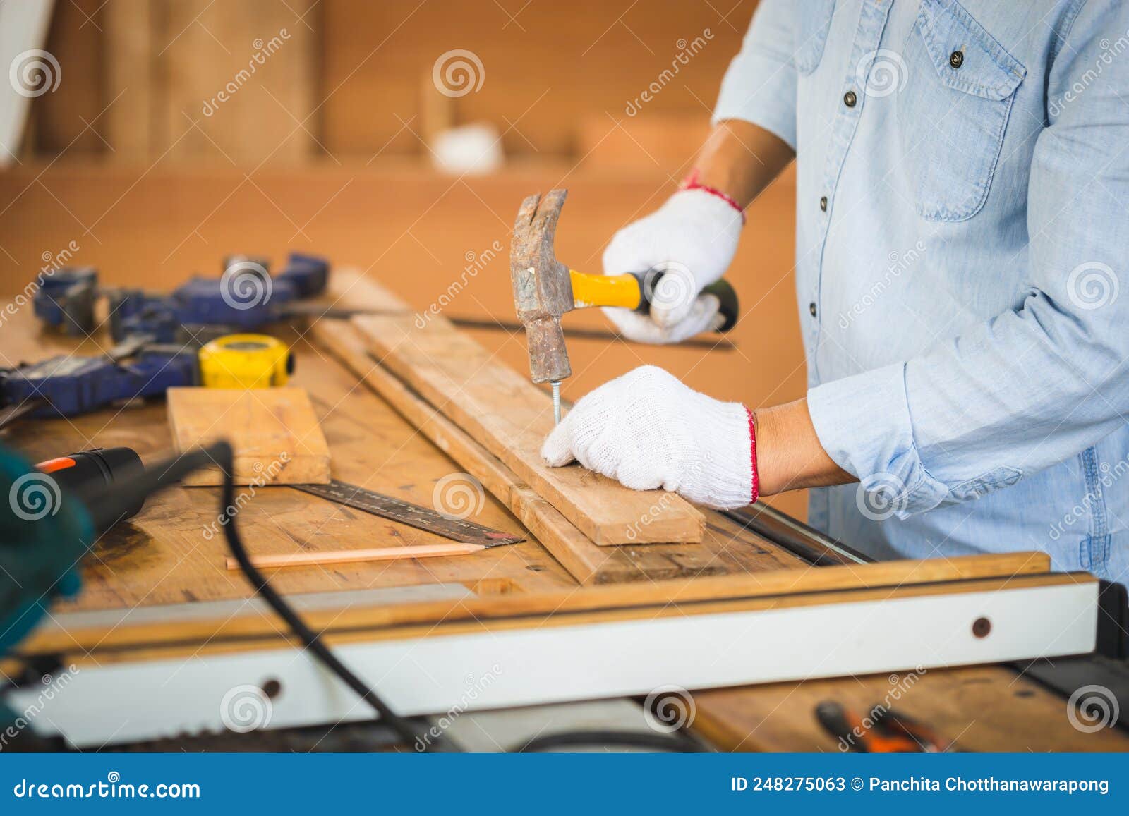 Craftsman Using Hammer Hobnailed in Workshop, Carpenter Using the ...