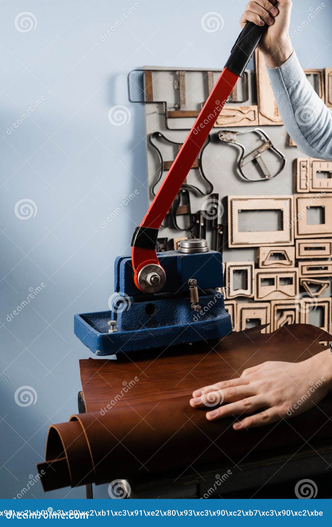 Craftsman is Using Leather Punching Press for Creating Forms from ...