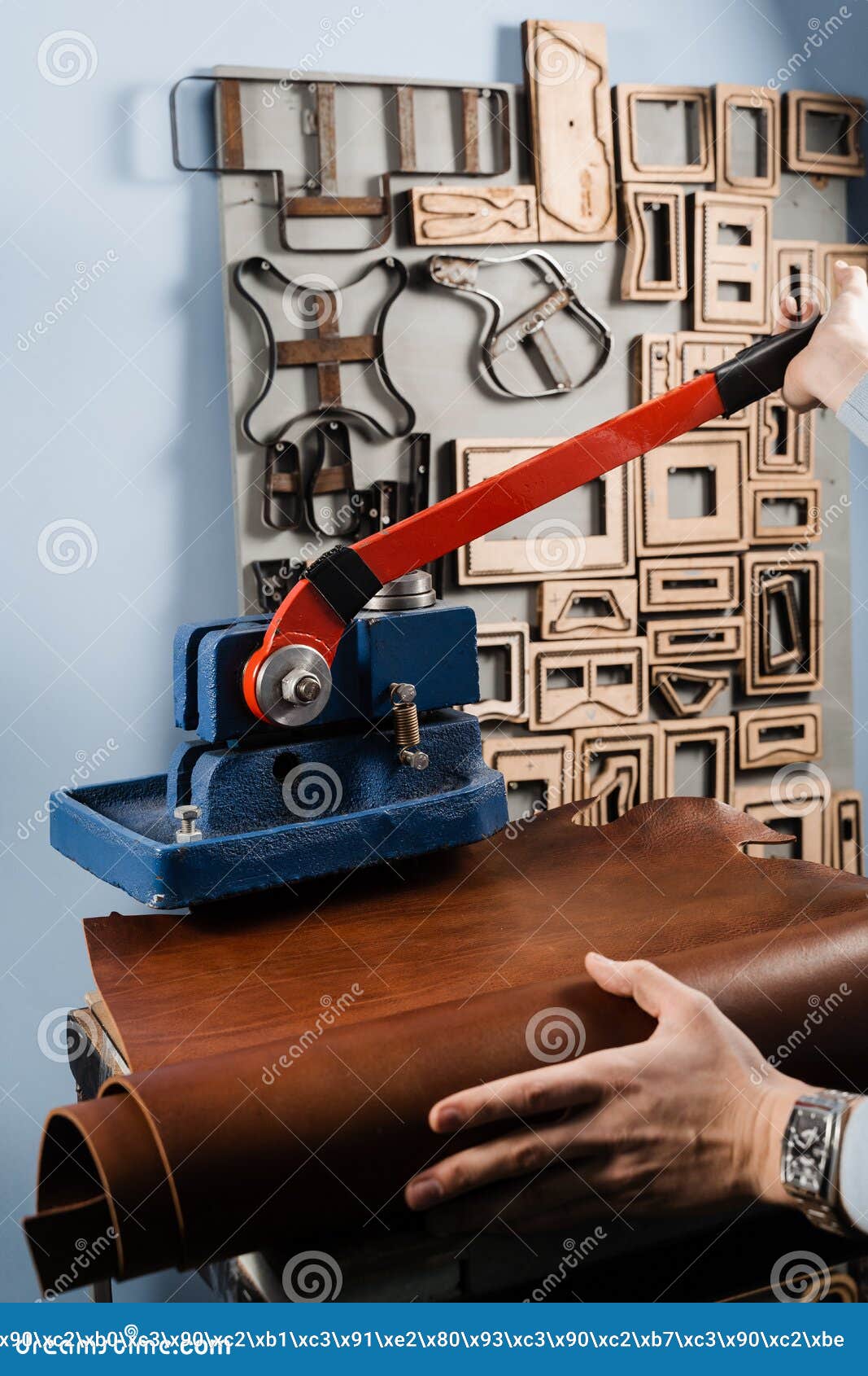 Craftsman is Using Leather Punching Press for Creating Forms from ...