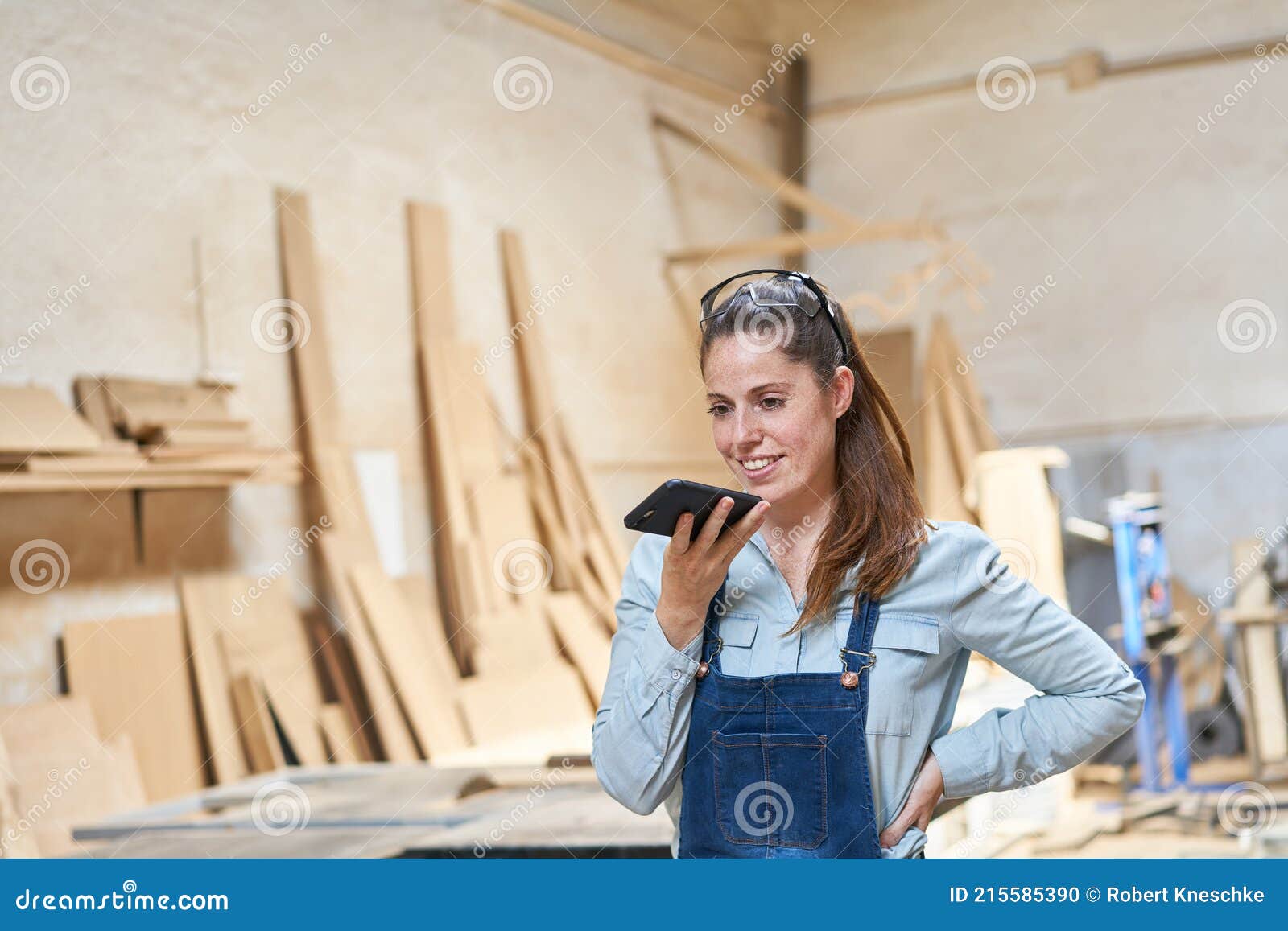 Craftsman Woman Using Smartphone in Carpentry Stock Photo - Image of ...