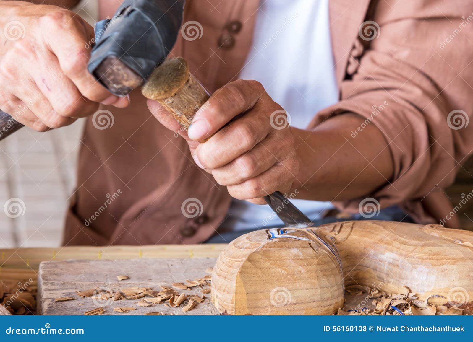Craftsman wood carving. stock photo. Image of manual - 56160108