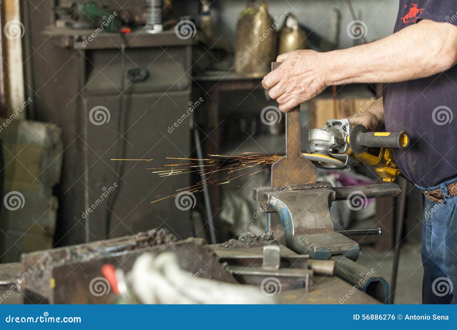 A Craftsman Working with a Hammer and Anvil Stock Photo - Image of ...