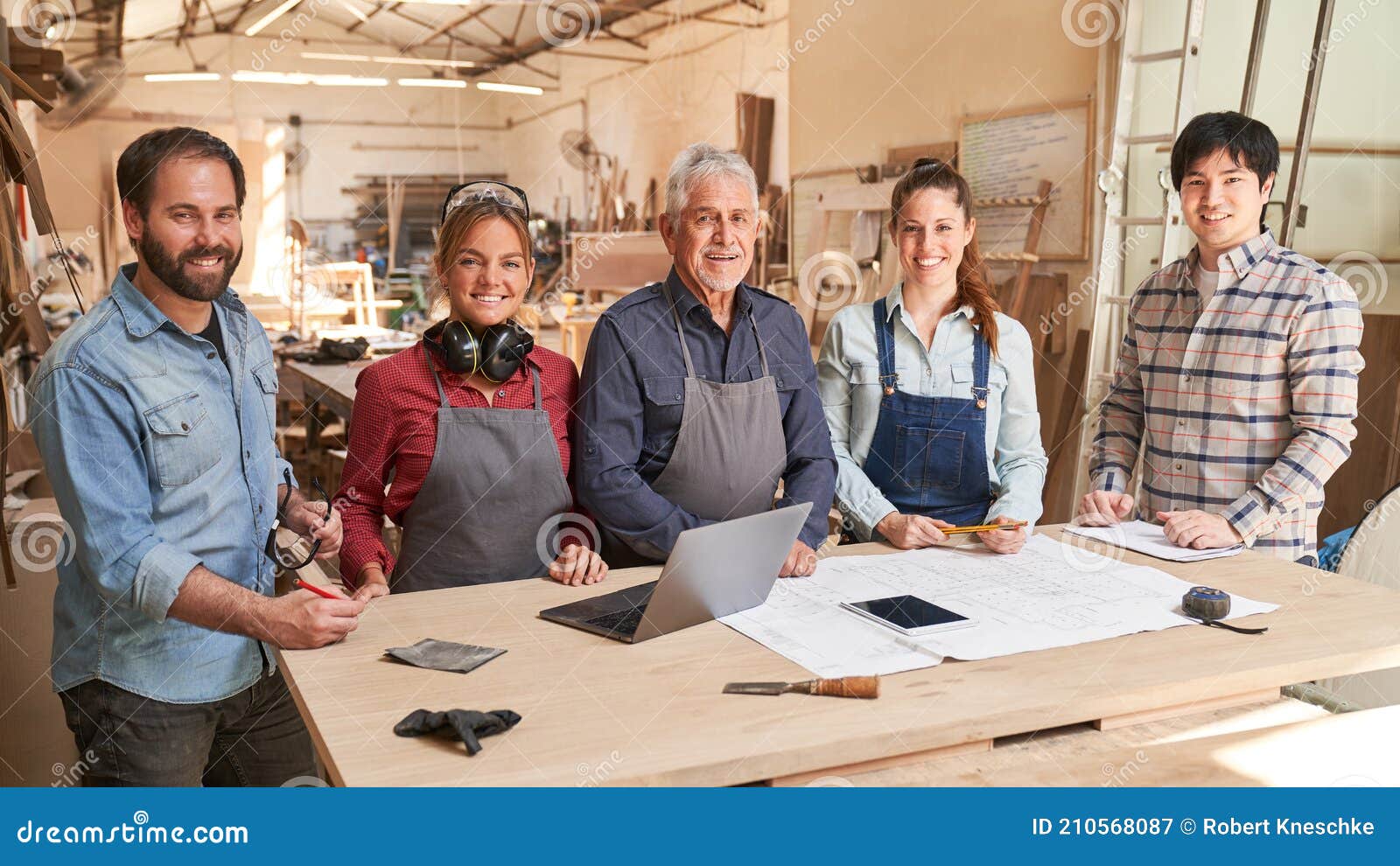 Craftsmen As Carpenters Team with Apprentices Stock Image - Image of ...