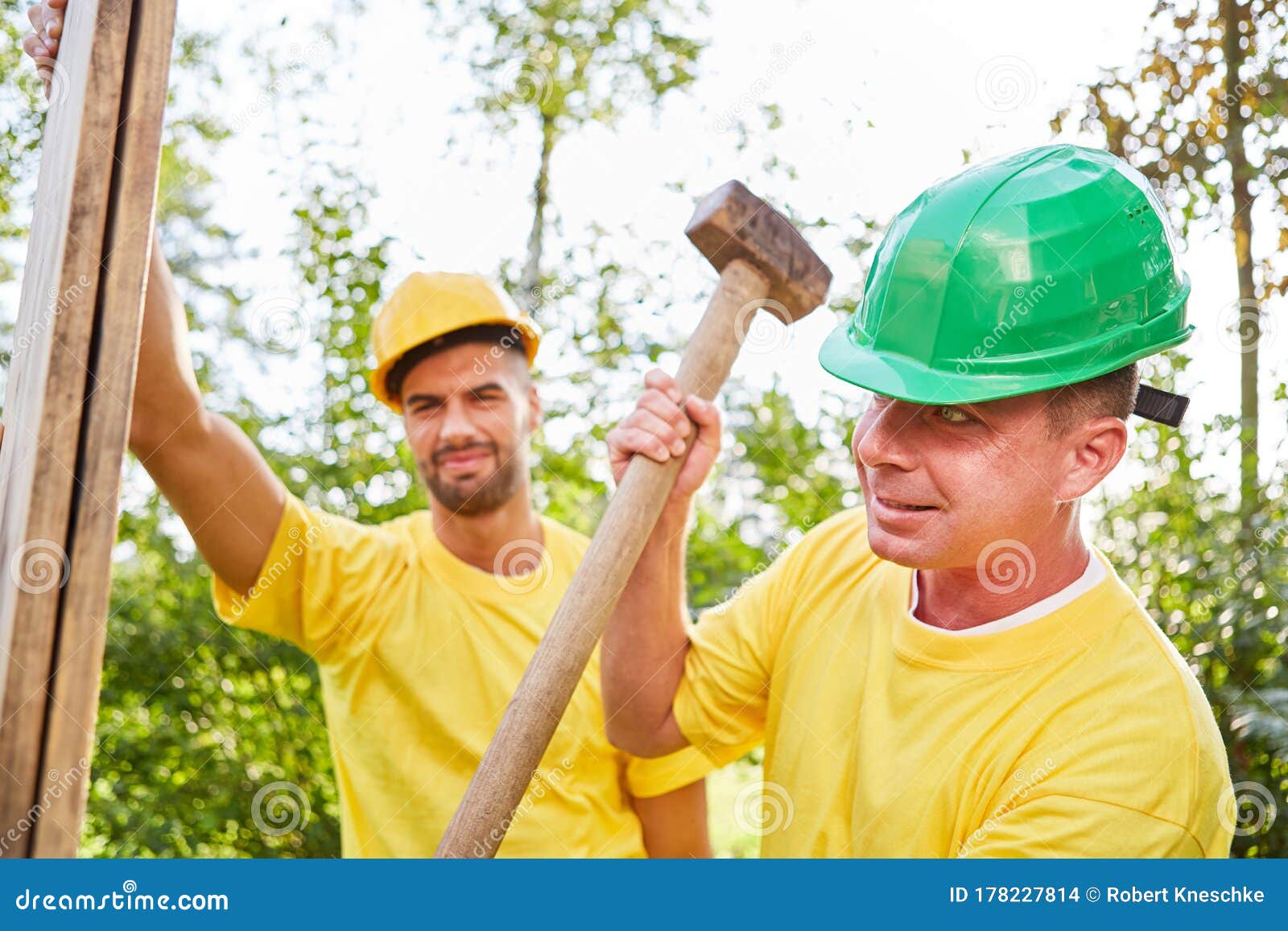 Craftsmen Make Teamwork while Building a House Stock Photo - Image of ...