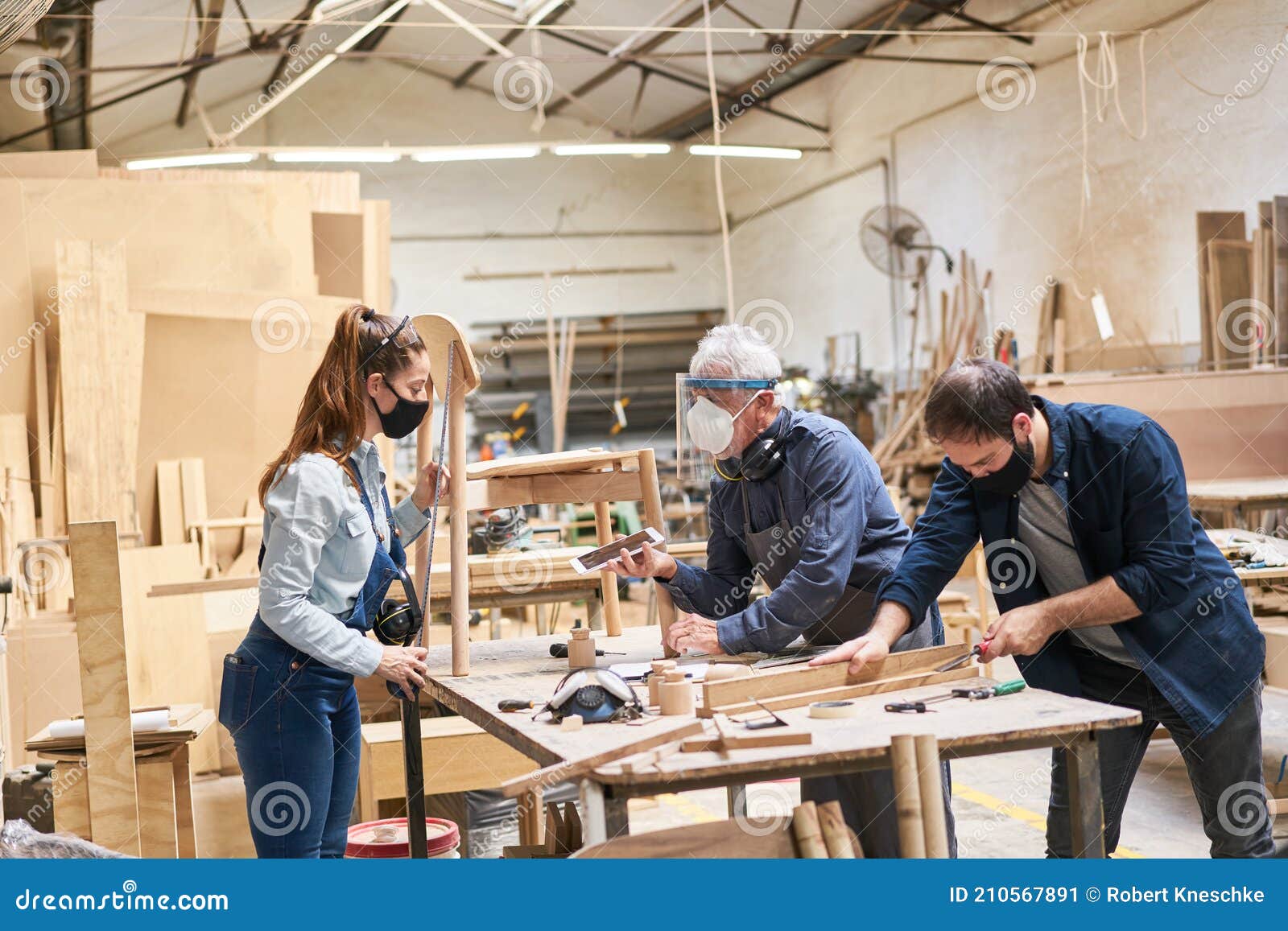 Craftsmen Team with Face Mask because of Covid-19 Stock Image - Image ...