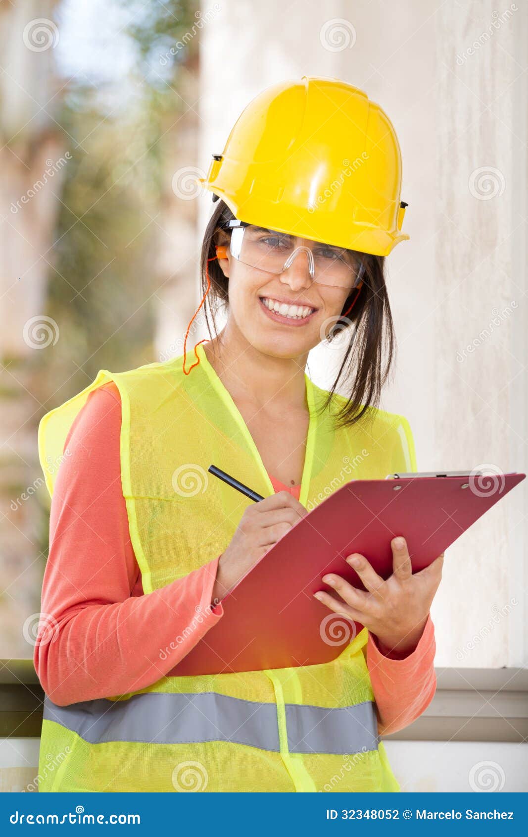 Craftswoman Holding a Notepad and Writing Stock Photo - Image of frame ...