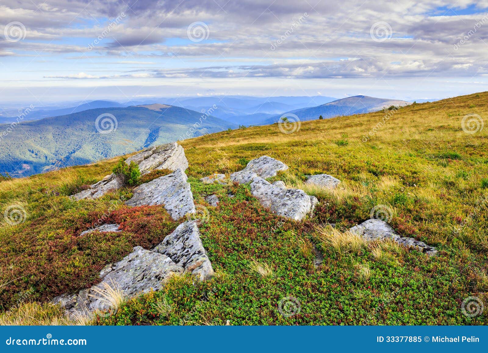 Craggy Rocks from the Grass on a Hillside Stock Image - Image of moss ...