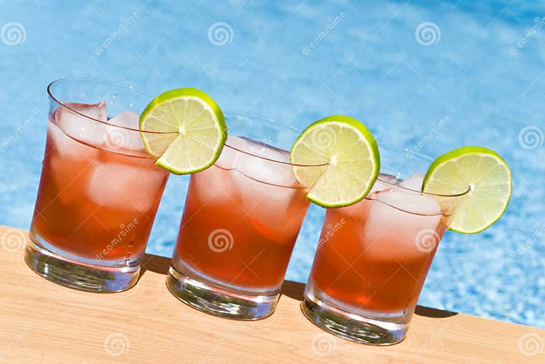 Cranberry Cocktail by the Pool Stock Image - Image of water, drink ...