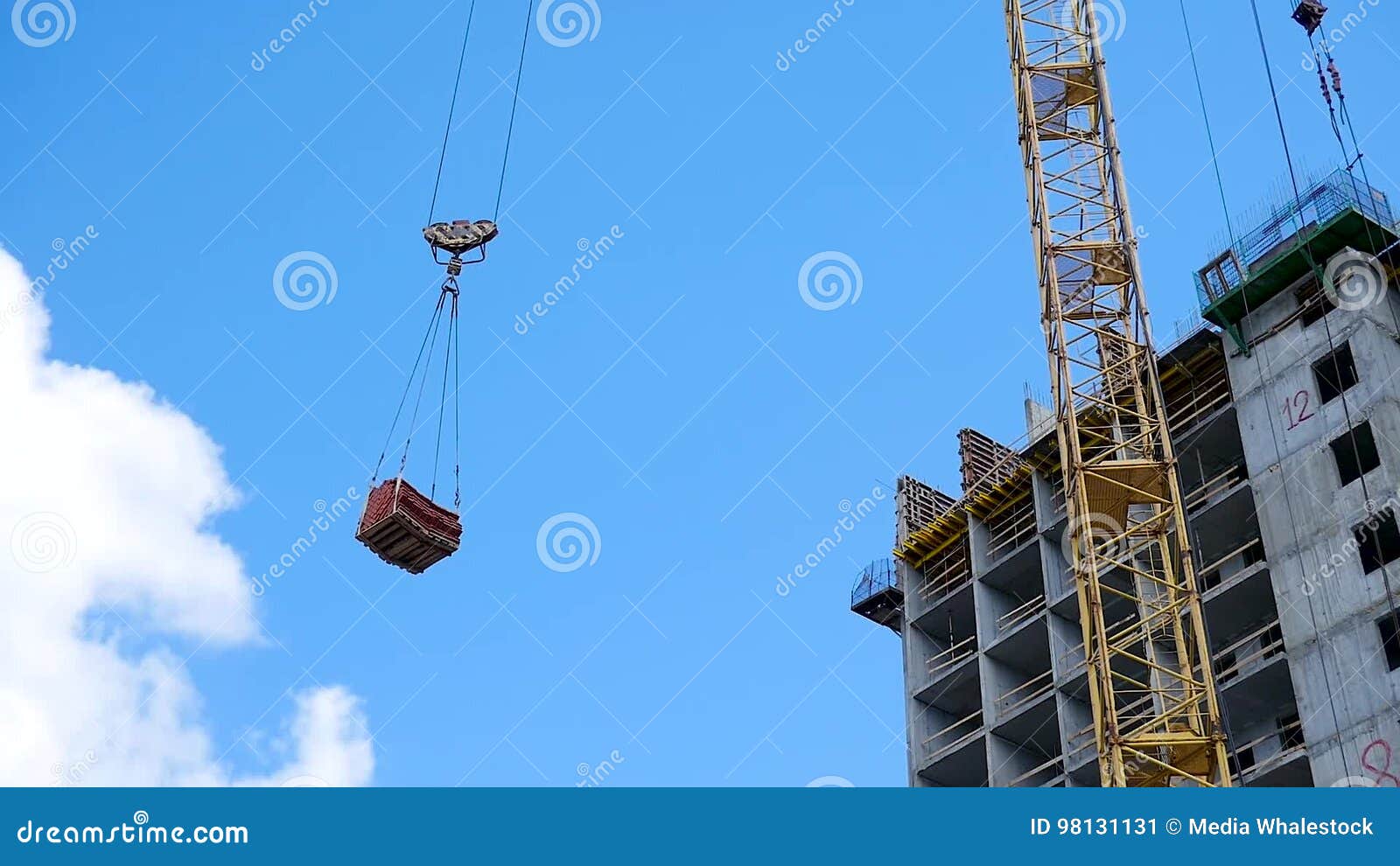 Crane and Building Construction Site Against Blue Sky. Heavy Load ...
