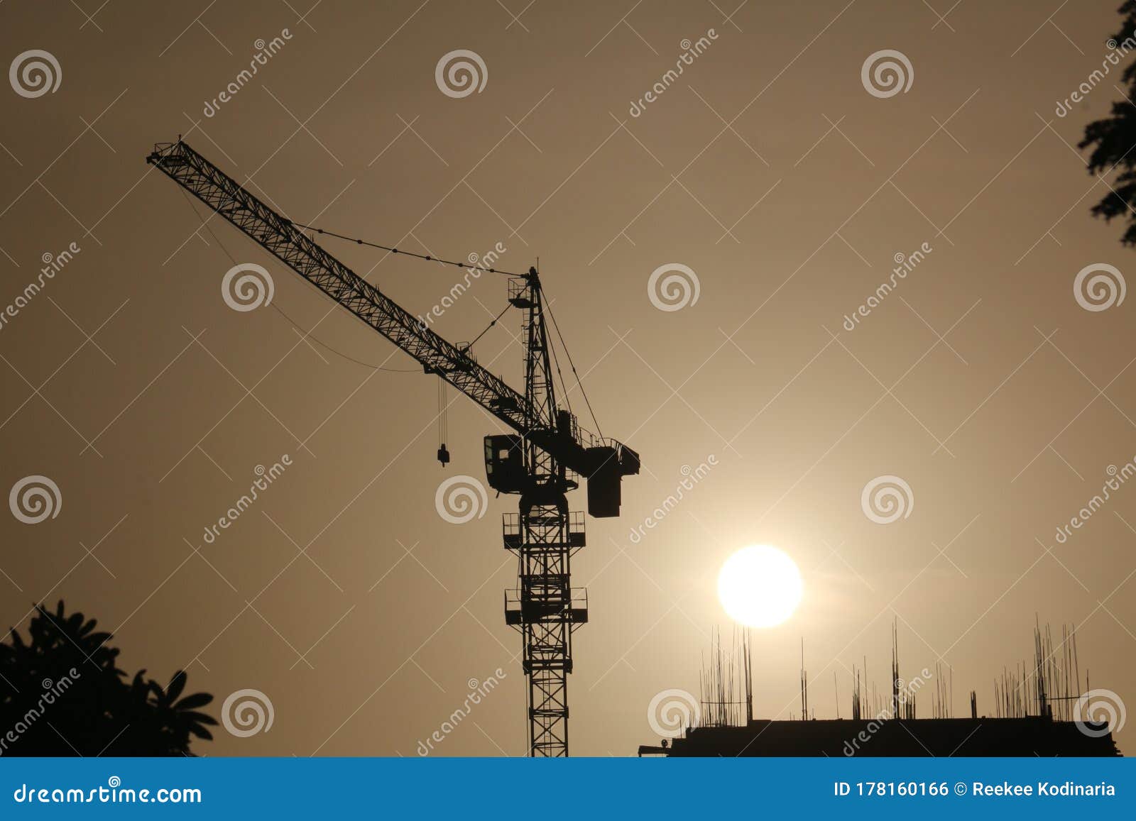 Crane and Building Construction Site at Sunset Stock Photo - Image of ...
