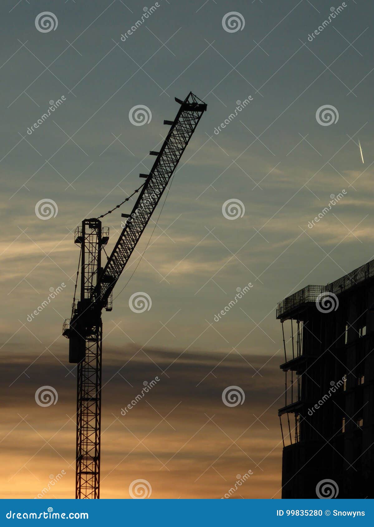 Crane and Building Construction at Sunset Stock Photo - Image of ...