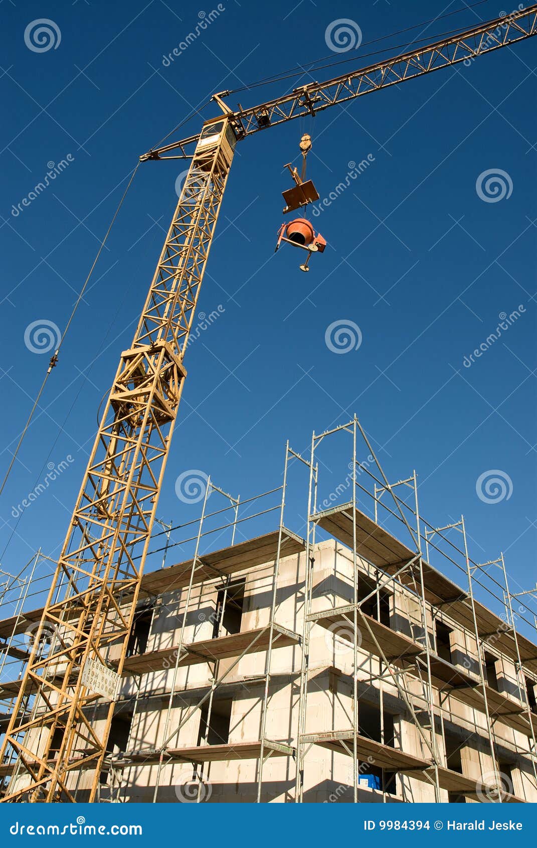 Crane and building site stock photo. Image of machinery - 9984394