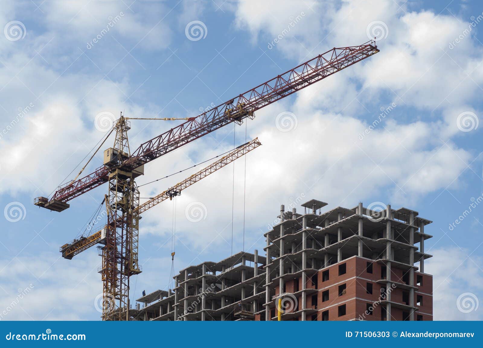 The crane builds houses stock image. Image of construction - 71506303