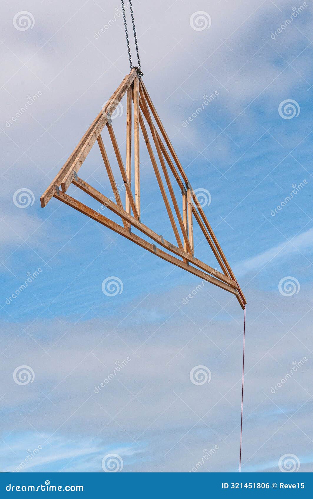 Crane Chains, Lifting and Moving Two Roof Trusses, into Position Stock ...