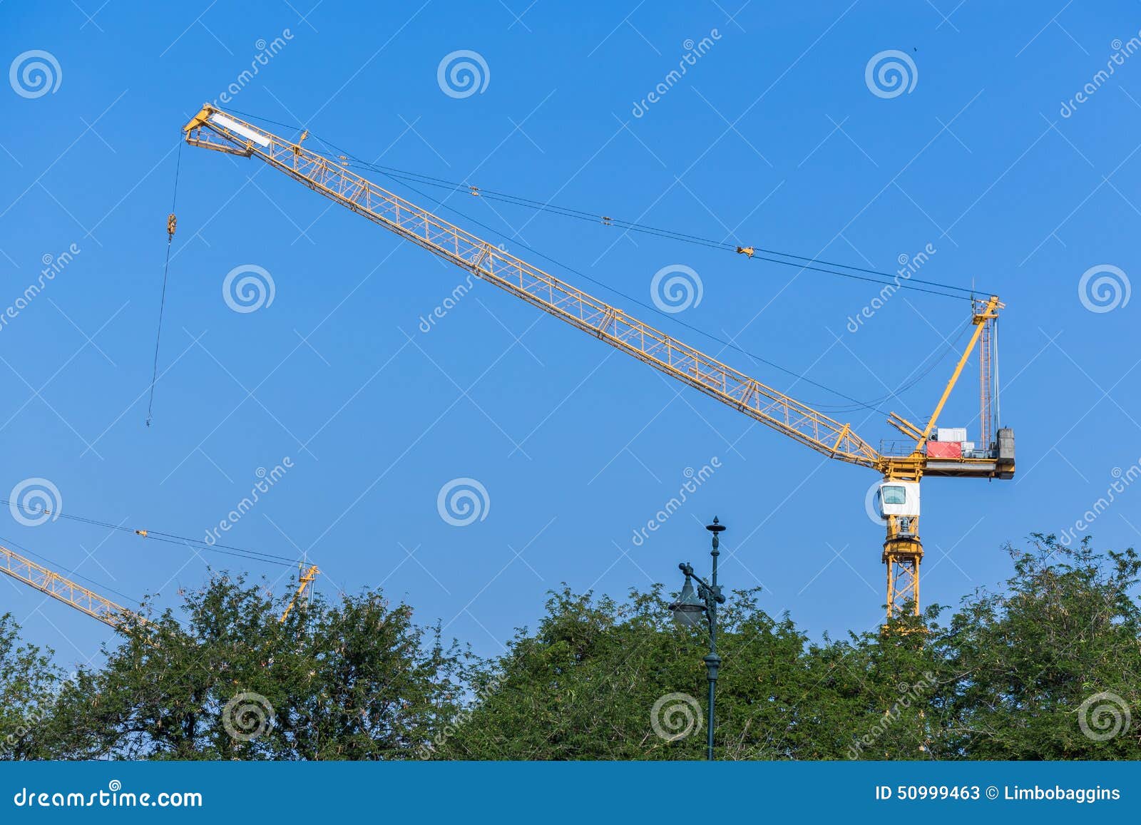 Crane in construction site stock image. Image of construct - 50999463