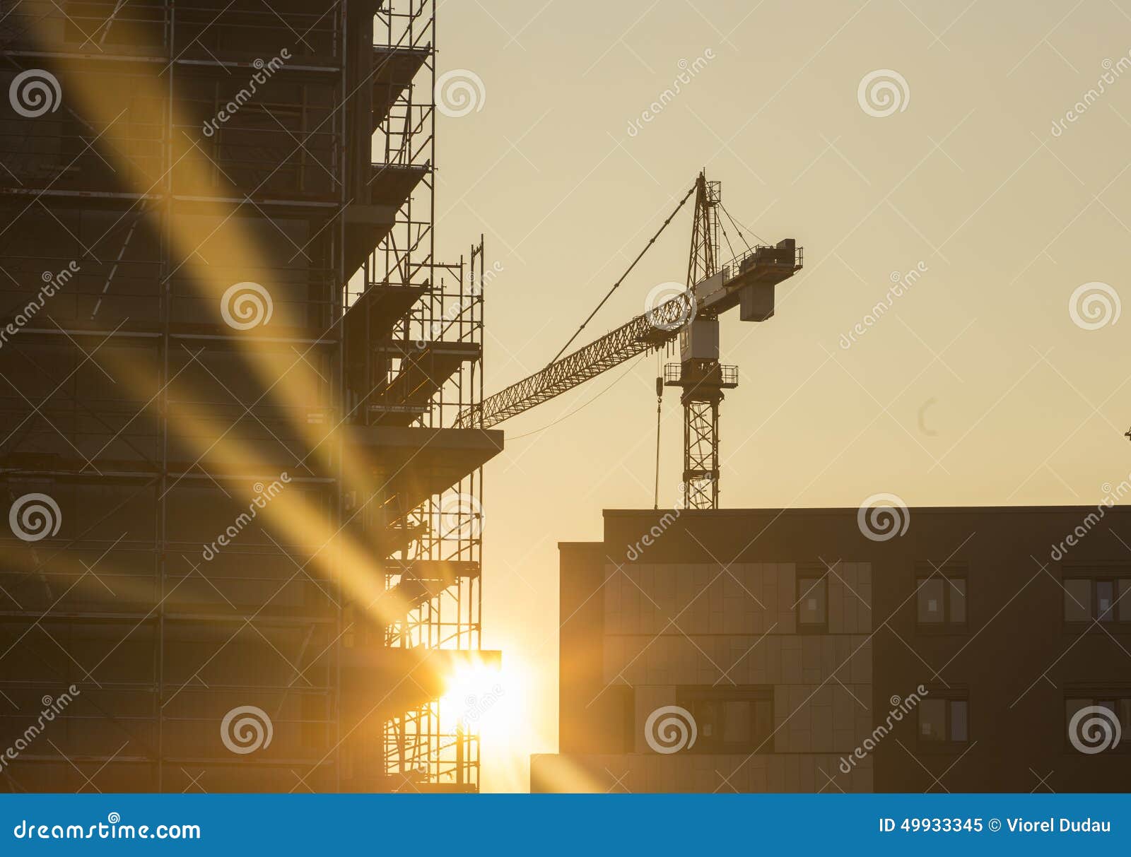Crane on construction site stock image. Image of built - 49933345