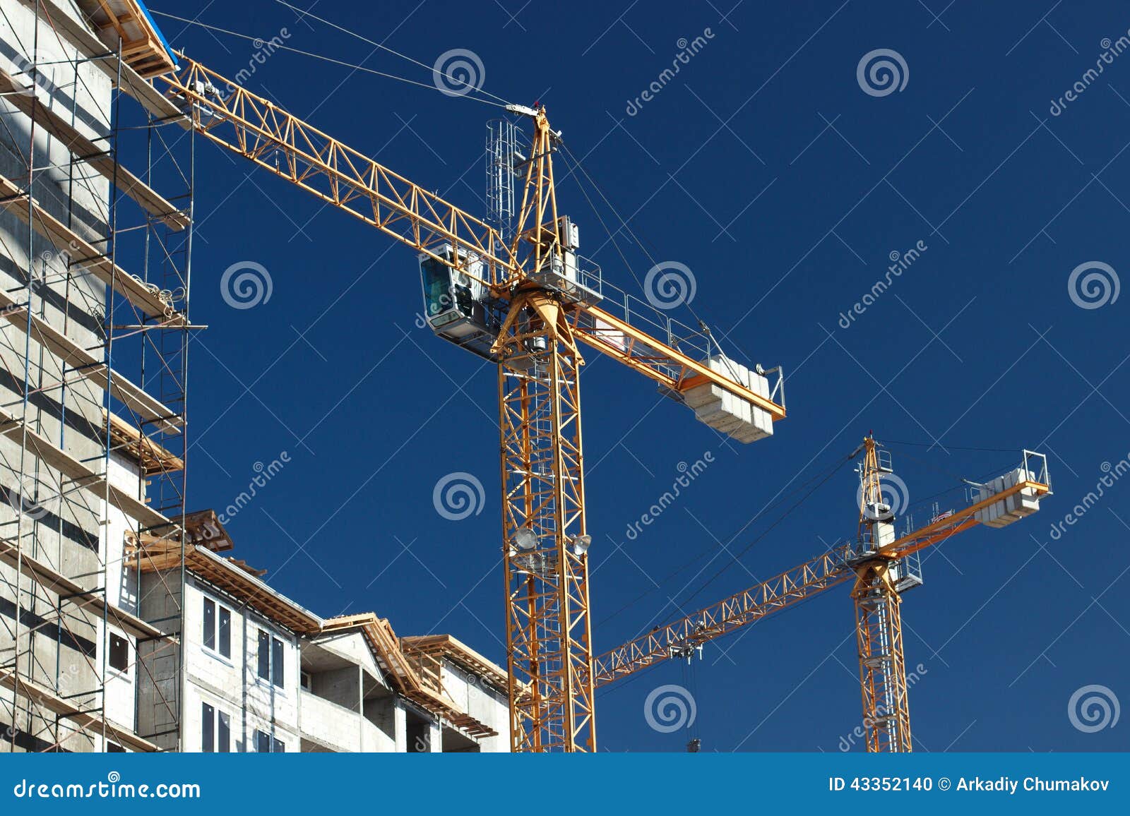Crane at construction site stock photo. Image of contrast - 43352140