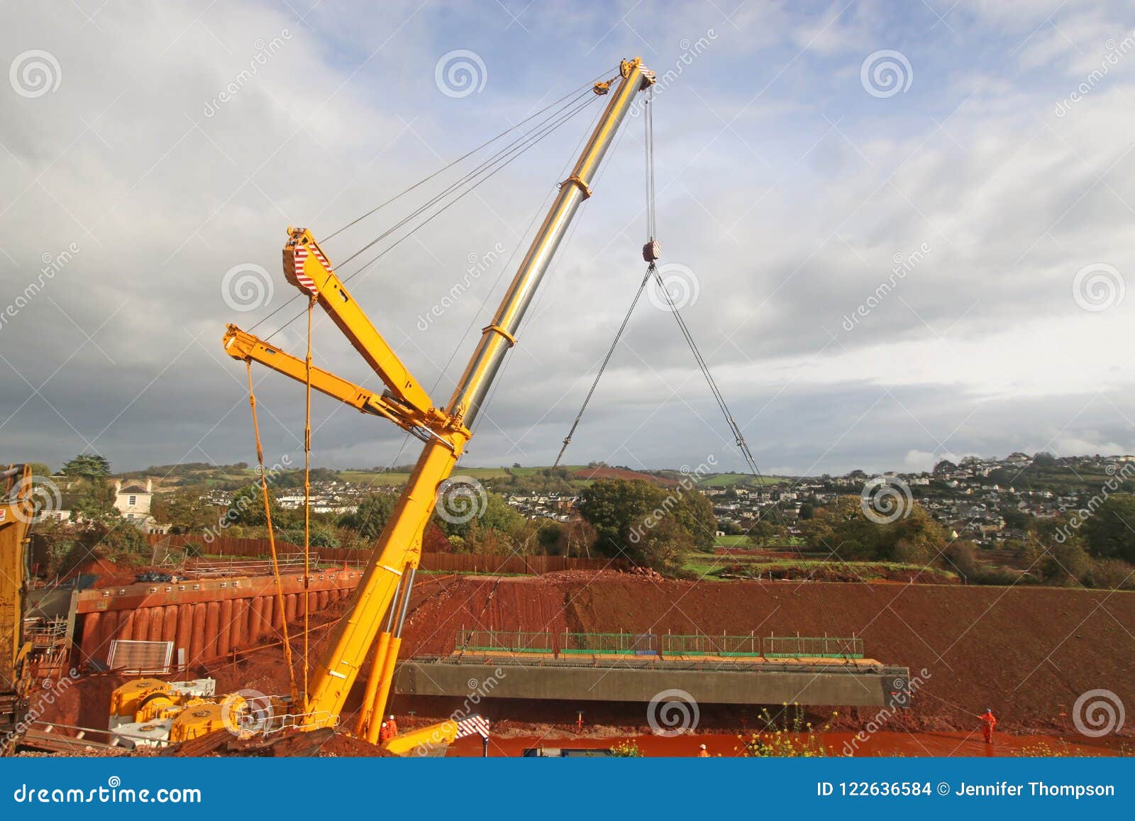 Crane Lifting a Concrete Beam Stock Photo - Image of support, plant ...