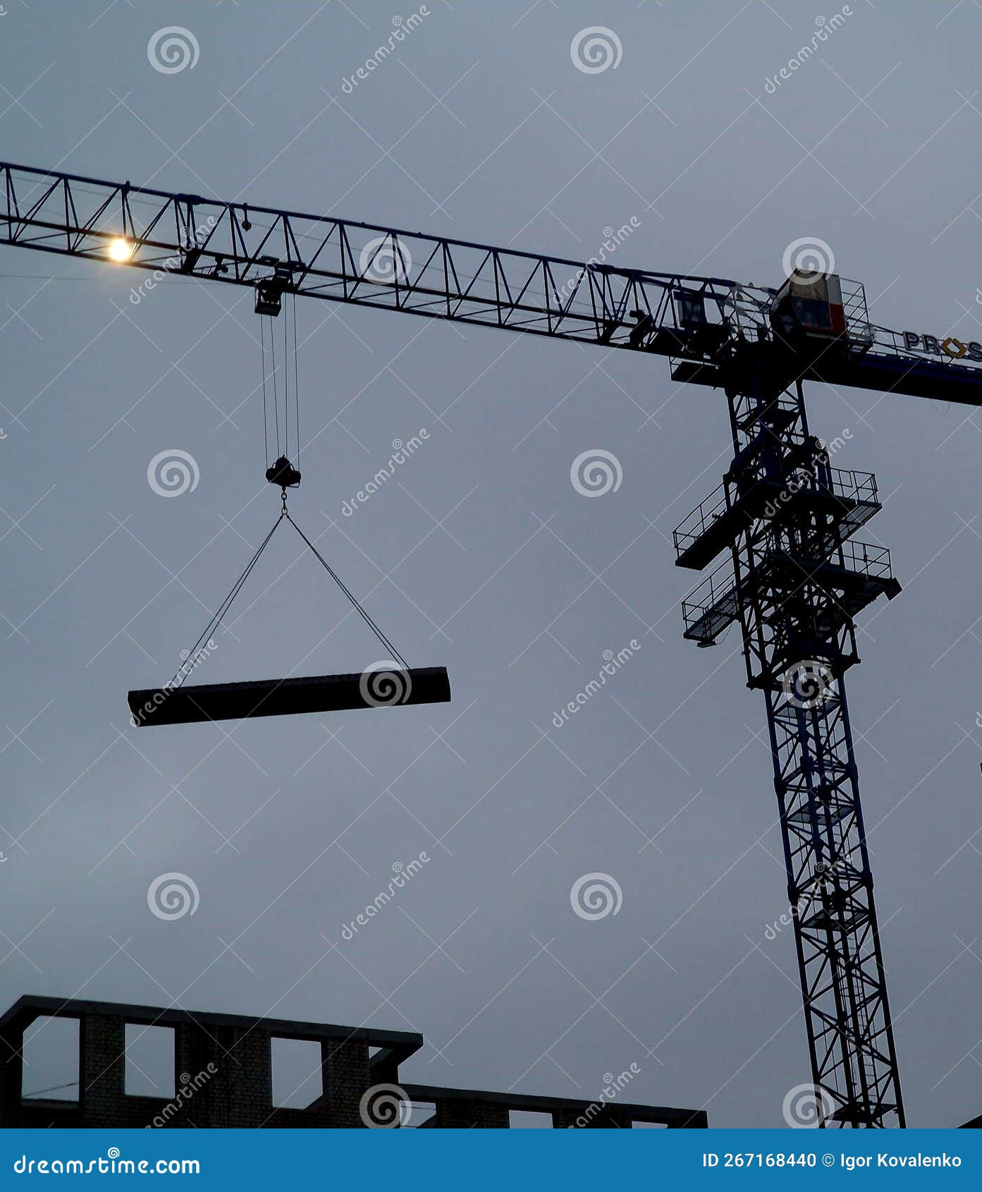 Crane at a Construction Site Lifts a Concrete Slab. Stock Photo - Image ...