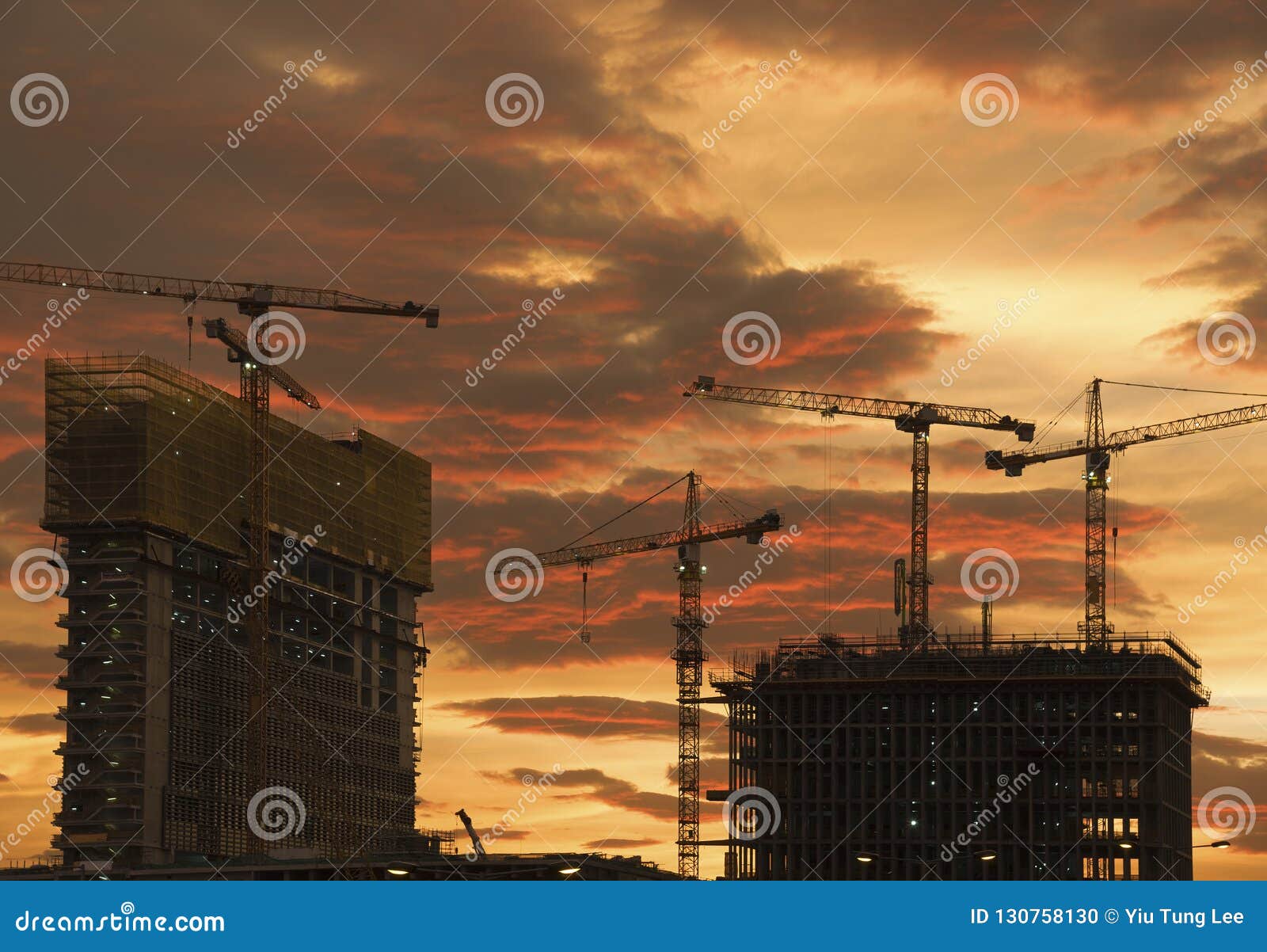 Crane in construction site stock photo. Image of elevator - 130758130