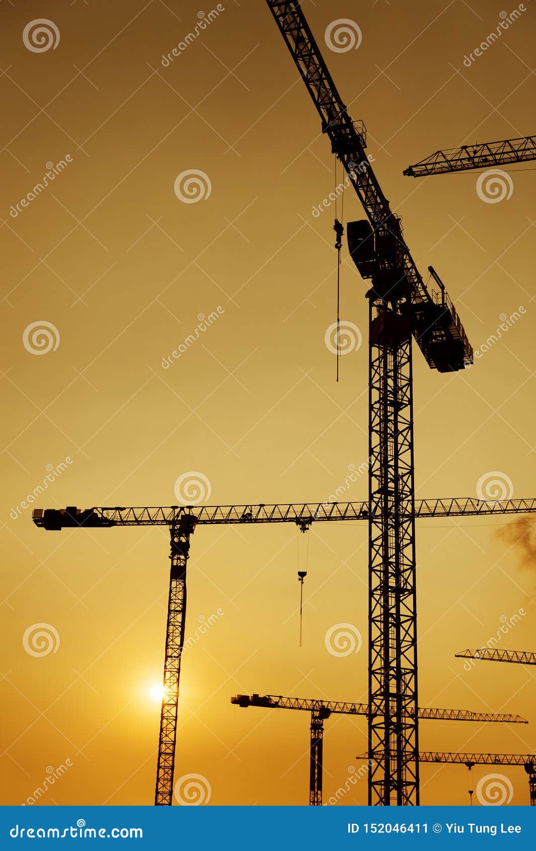 Crane in construction site stock image. Image of metal - 152046411