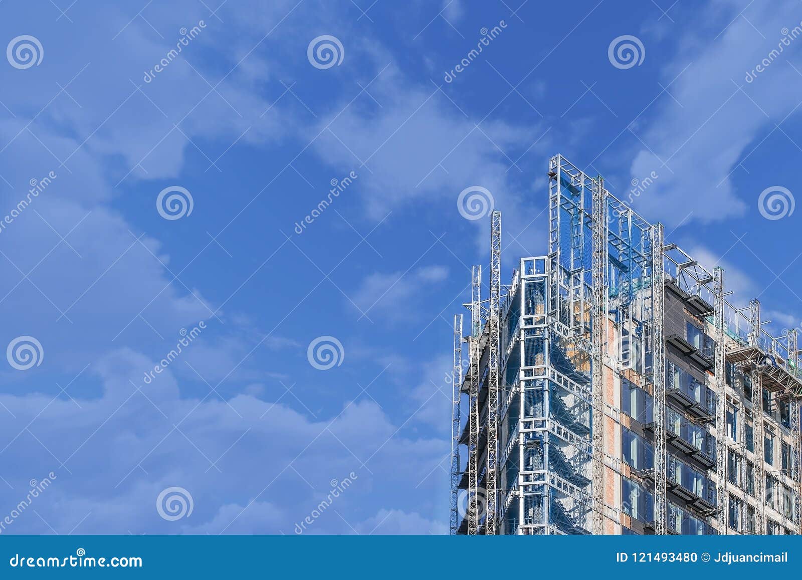 A Crane in a Construction Work. Tall Scaffold Structure from Below ...