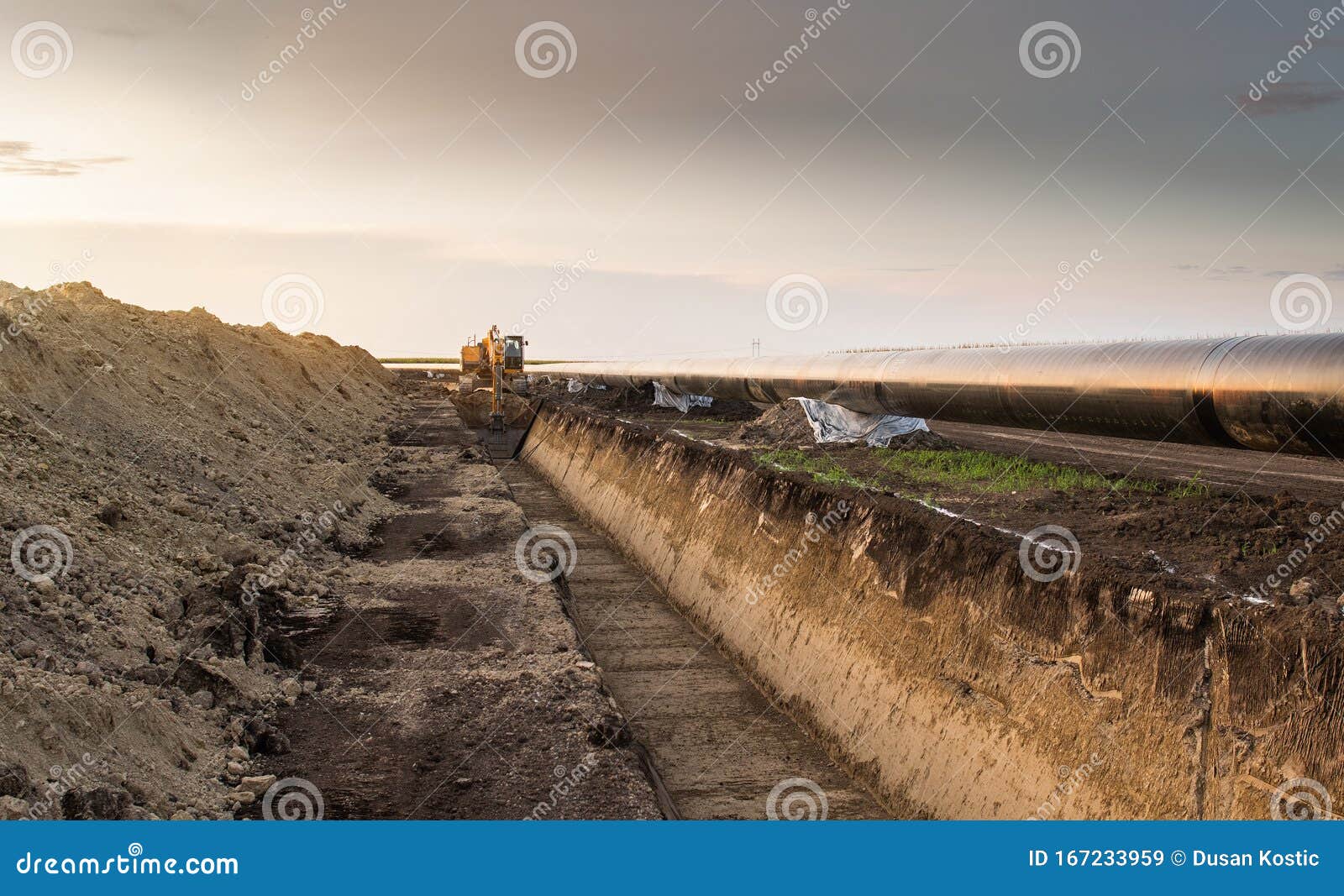 Crane Digging a Channel for Gas Pipeline Stock Image - Image of ...