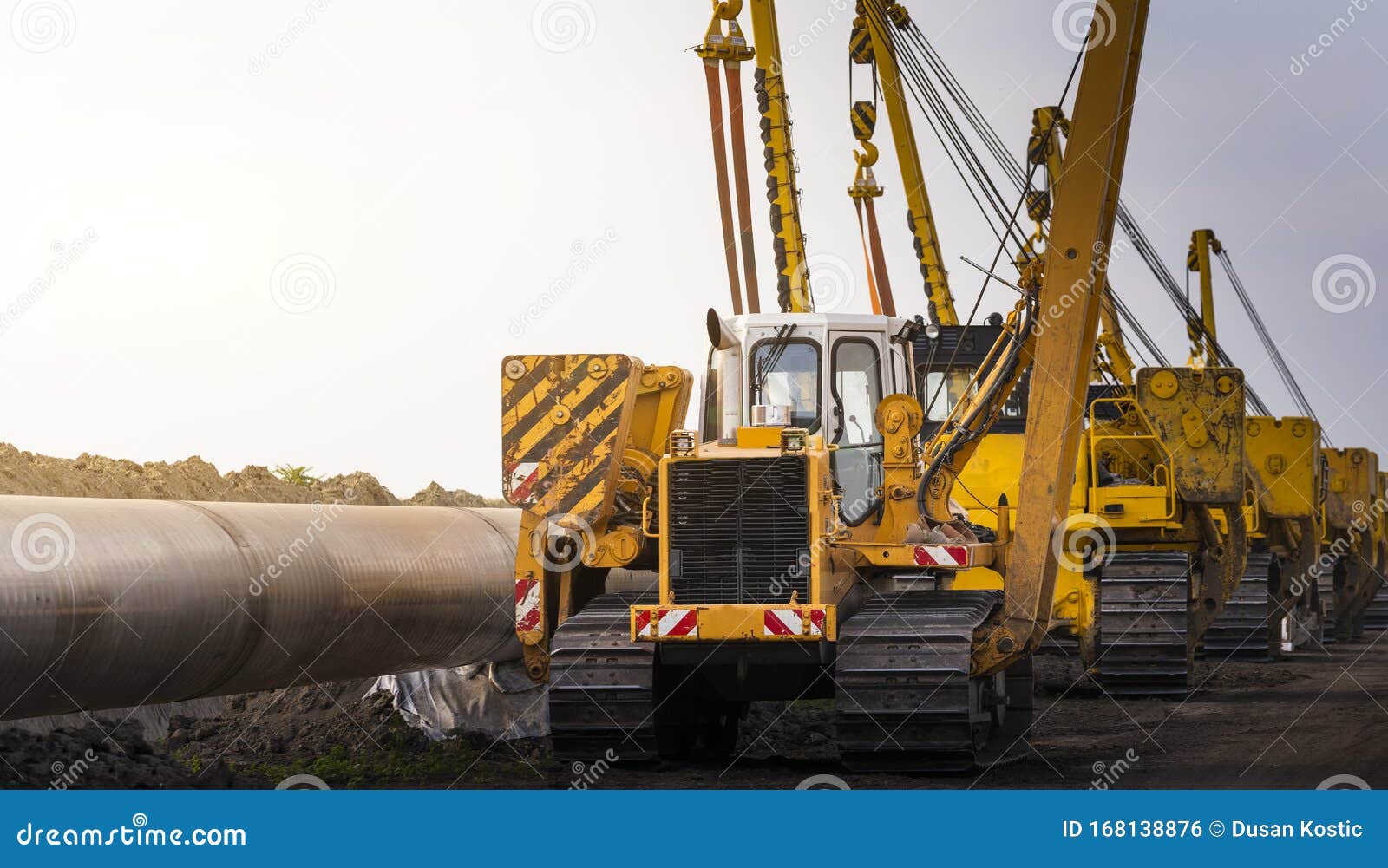 Crane Digging a Channel for Gas Pipeline Stock Photo - Image of evening ...