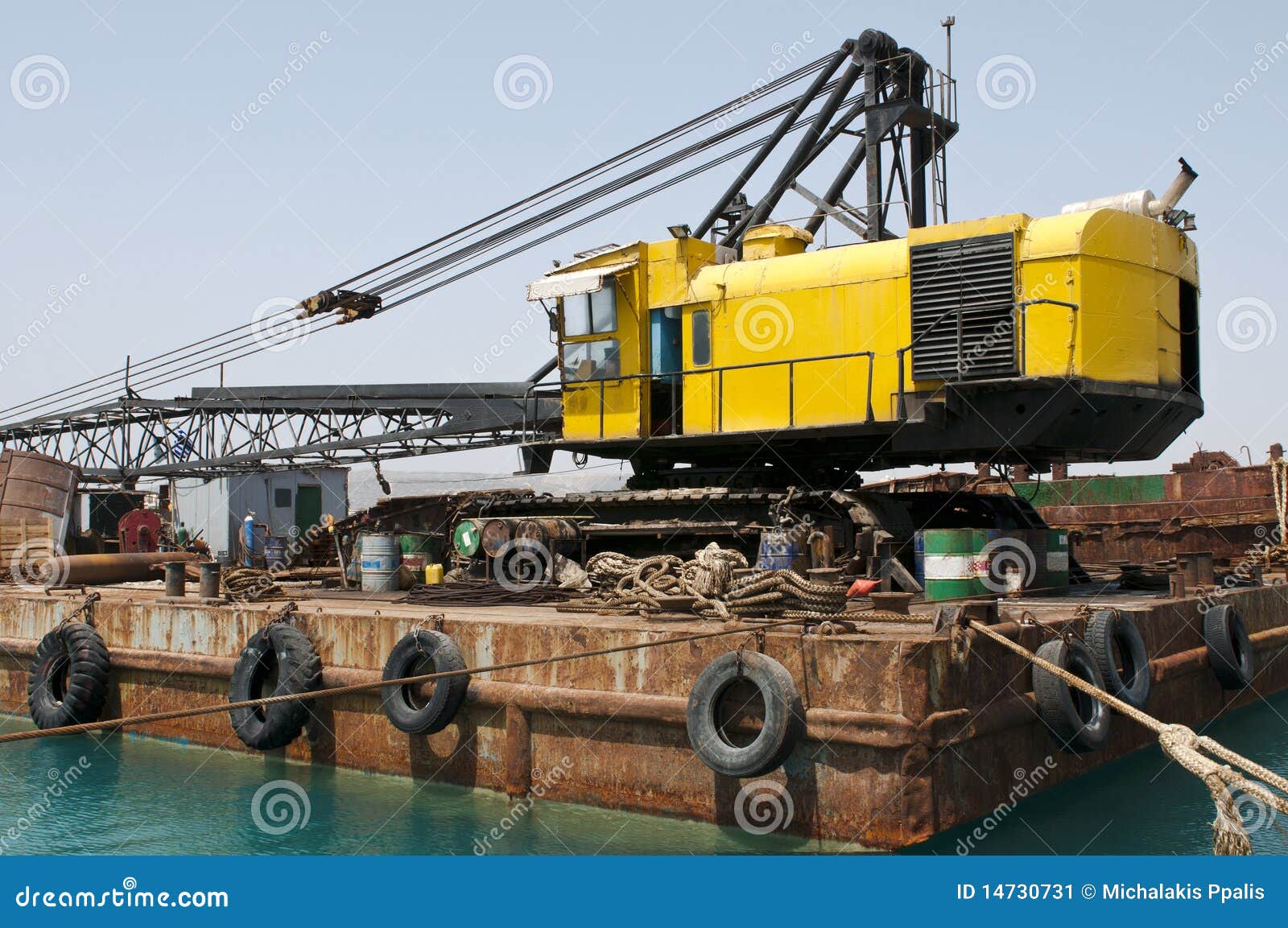 Crane digging the harbour stock image. Image of port - 14730731