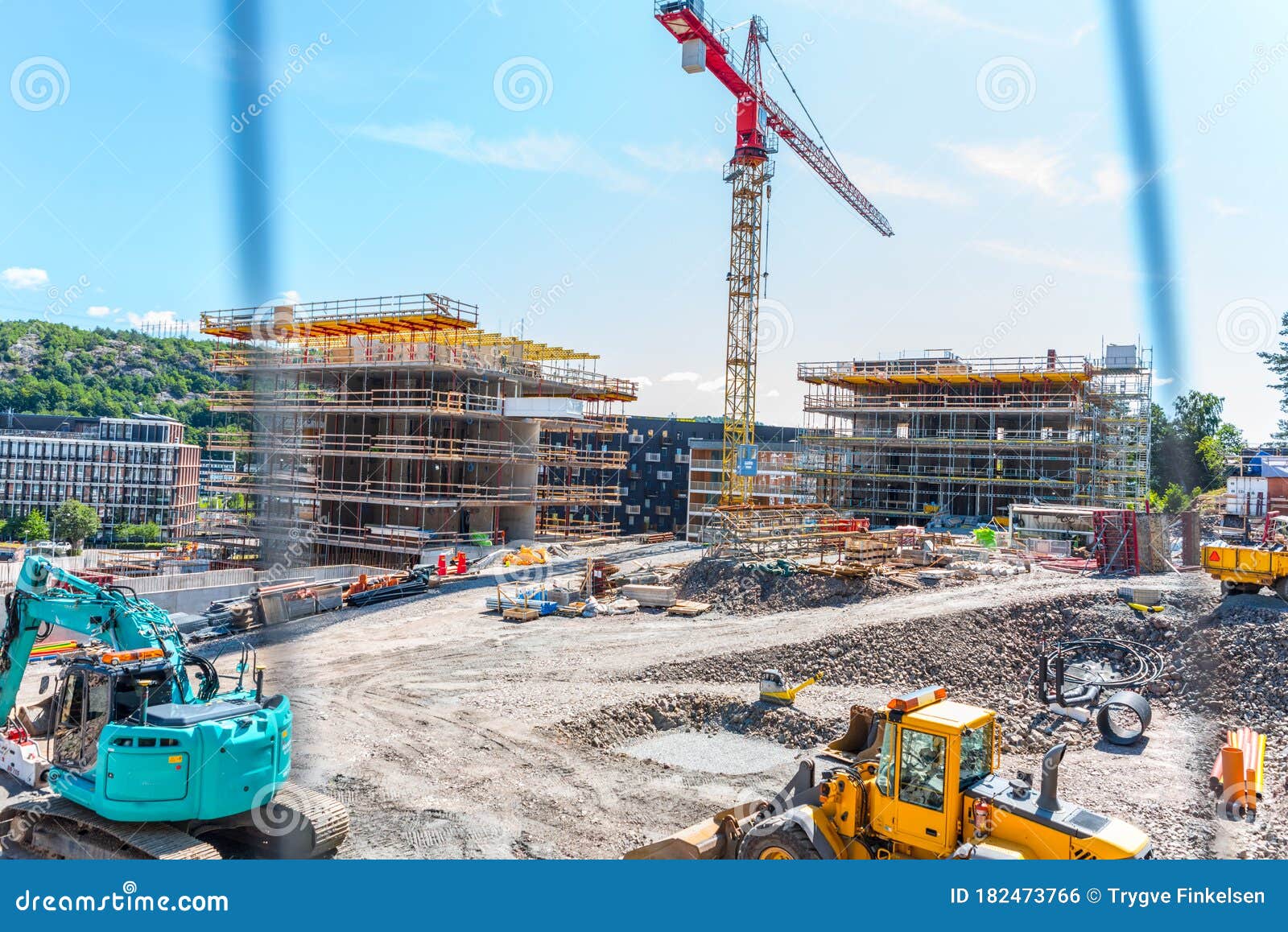 Crane and Heavy Equipment at a Construction Site Stock Photo - Image of ...