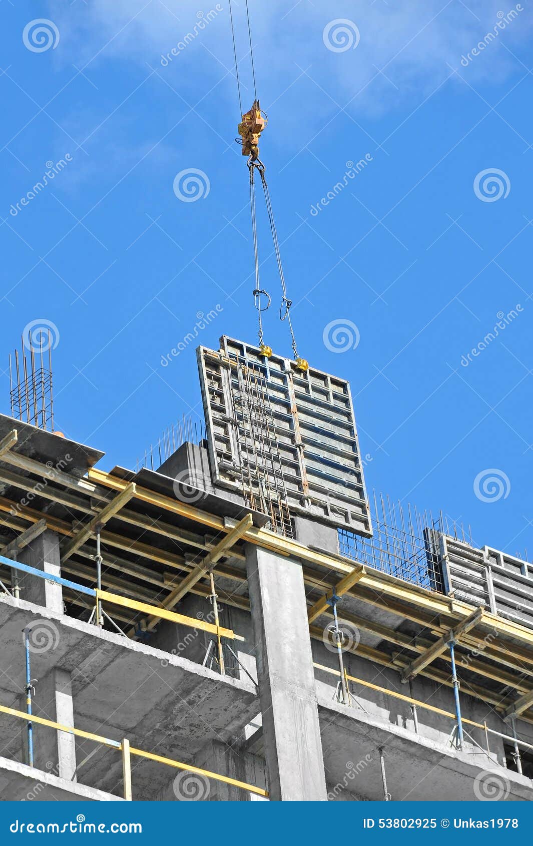 Crane hoisting formwork stock image. Image of construction - 53802925