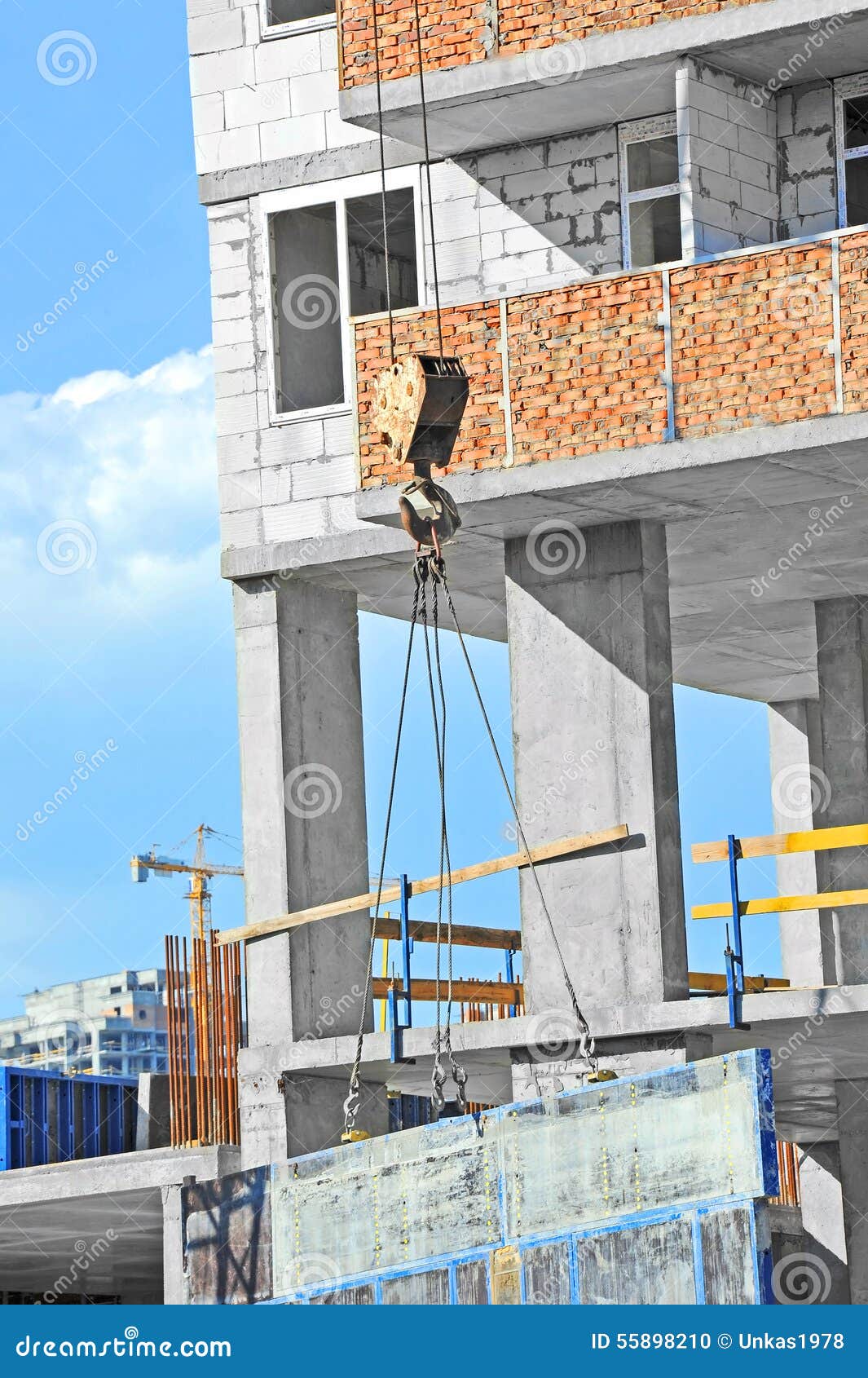 Crane hoisting formwork stock photo. Image of architecture - 55898210