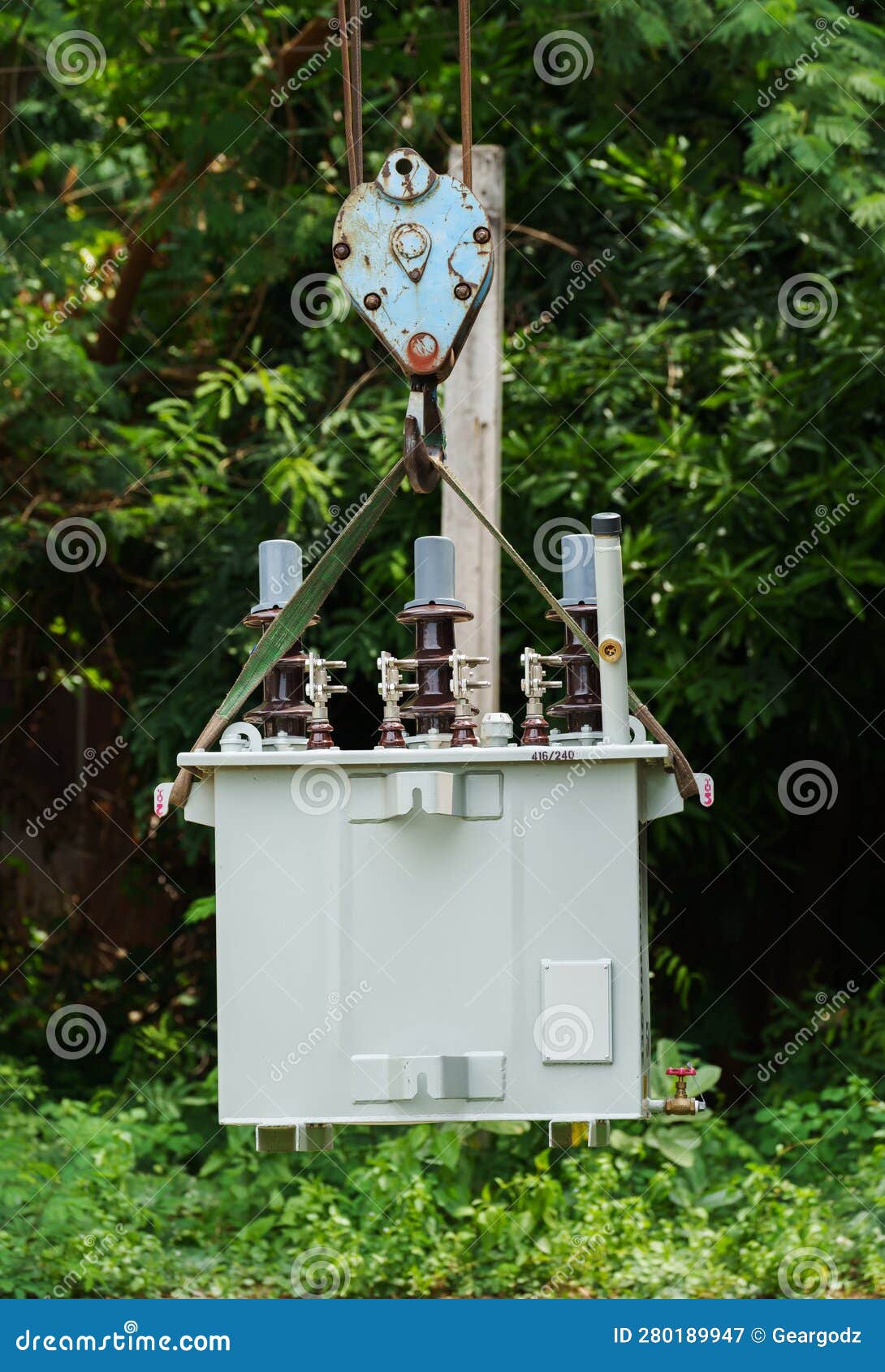 Crane Hook Lifts Up Distribution Transformer Stock Image - Image of ...