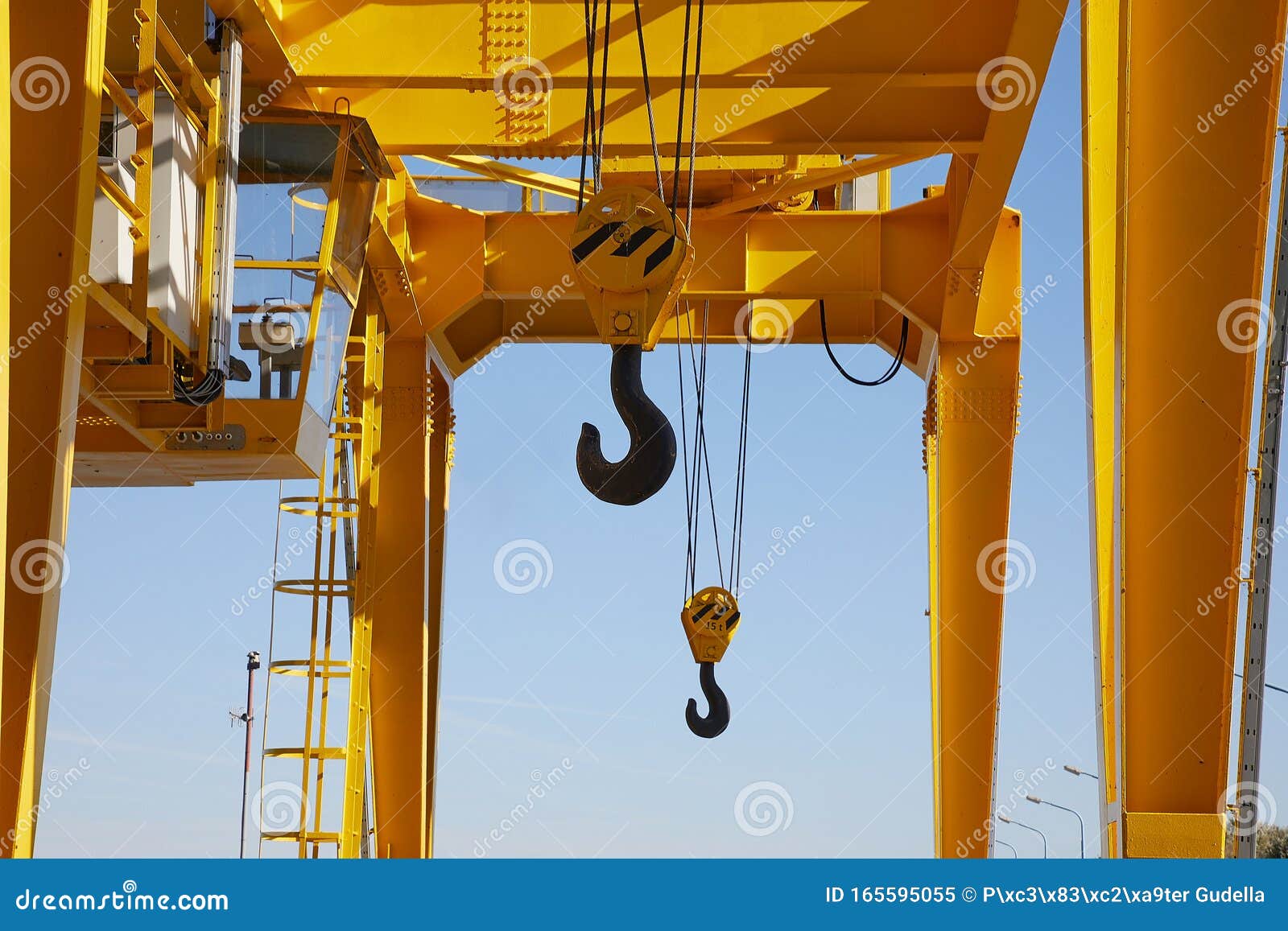 Crane with hooks hanging stock image. Image of cargo - 165595055