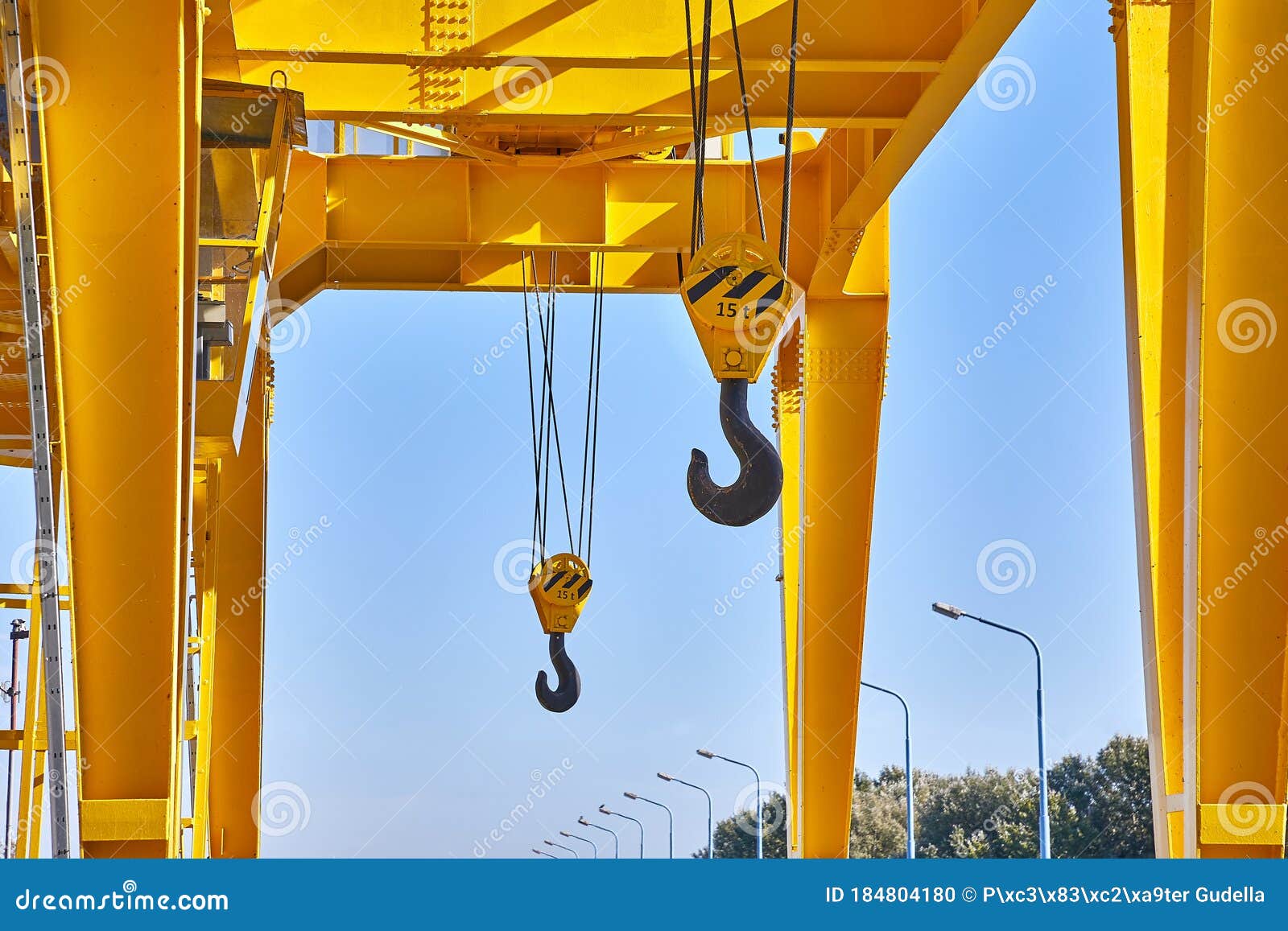 Crane with hooks hanging stock photo. Image of hook - 184804180