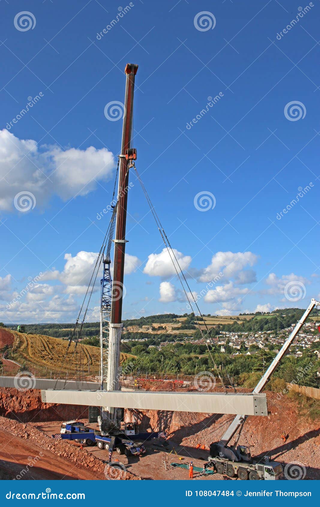 Crane laying a new bridge stock photo. Image of track - 108047484