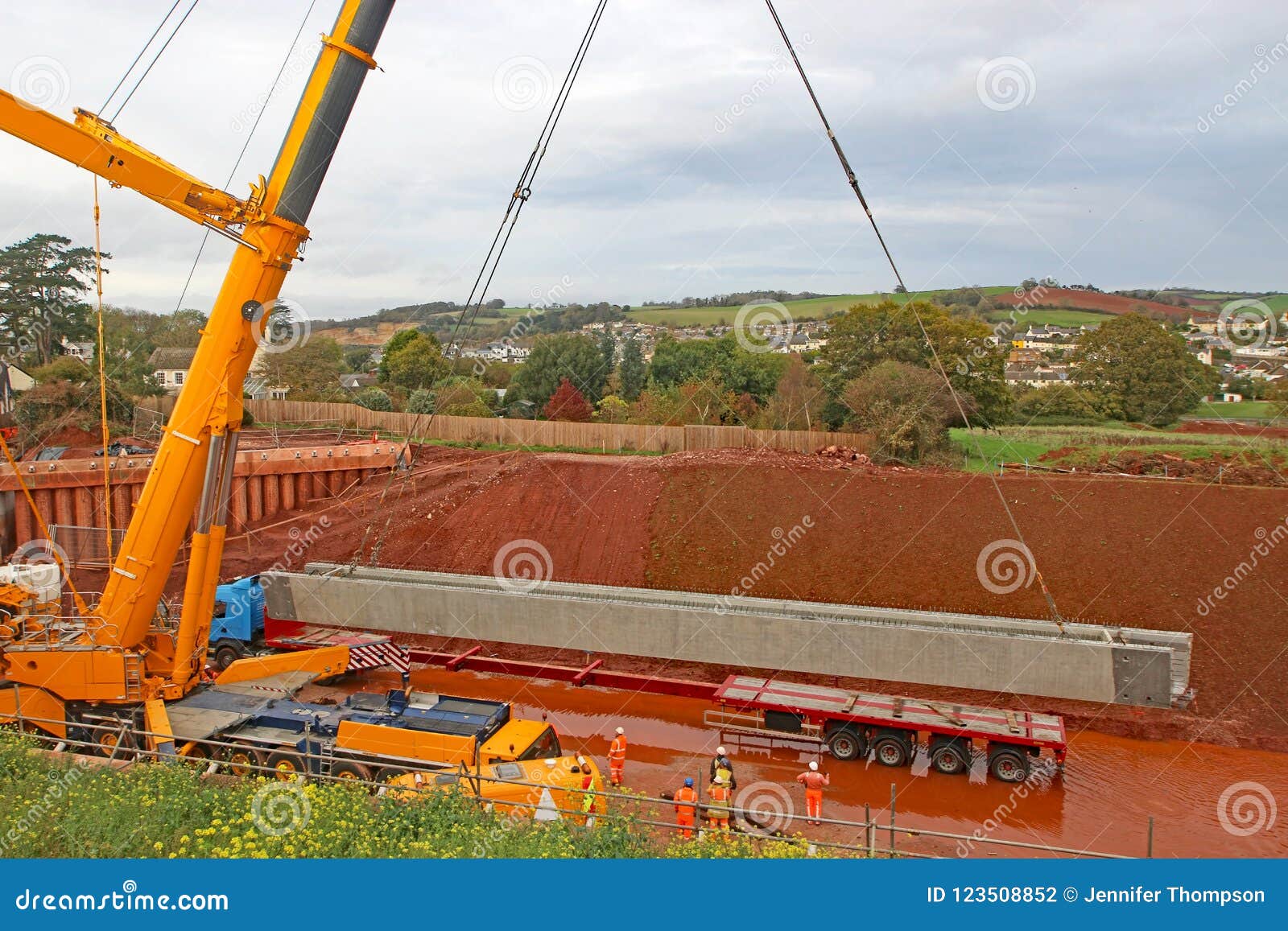 Crane Lifting a Bridge Beam Stock Photo - Image of dump, road: 123508852