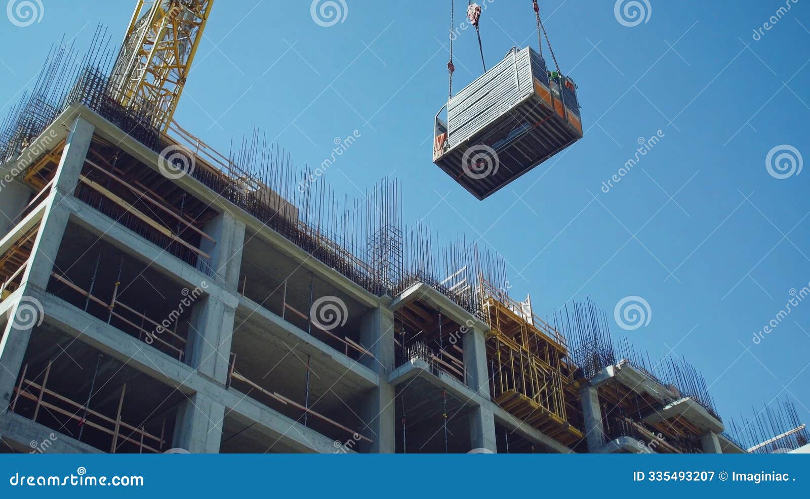 Crane Lifting Concrete Formwork during Construction of a Multi-Story ...