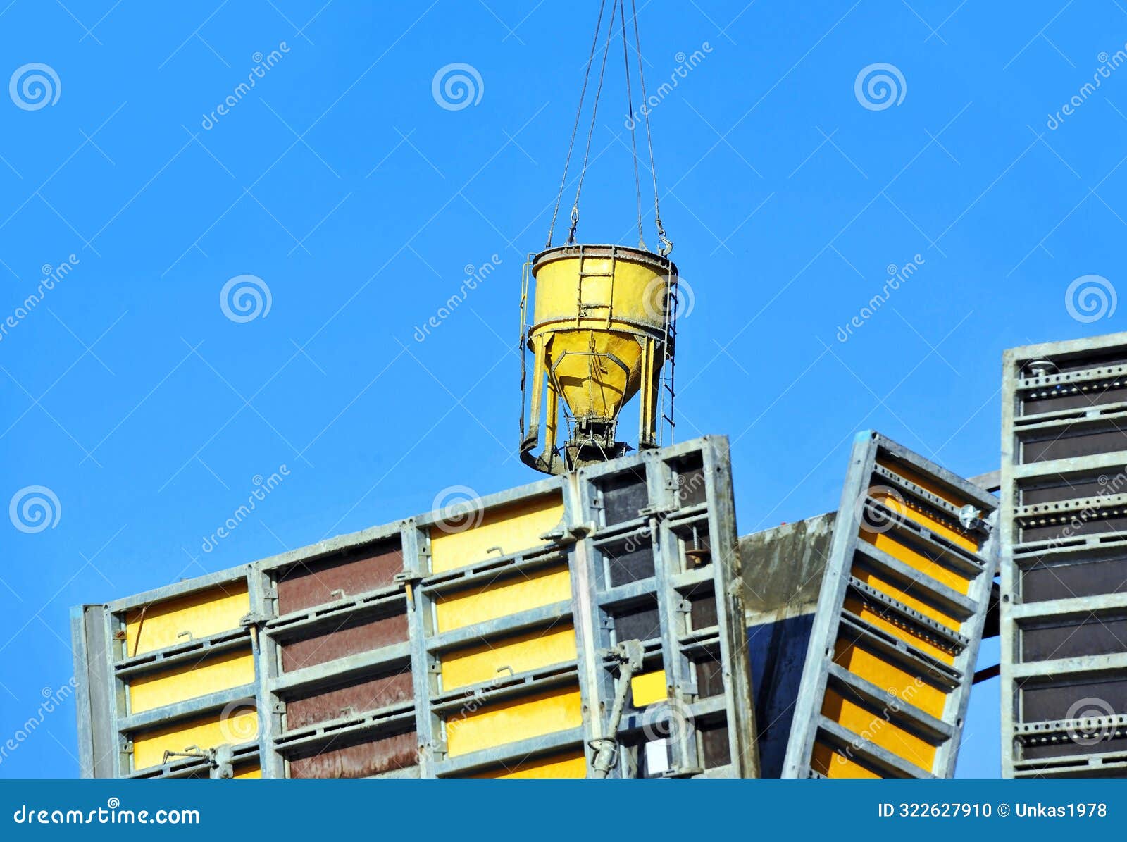 Crane Lifting Cone Tank Over Formwork Stock Photo - Image of ...