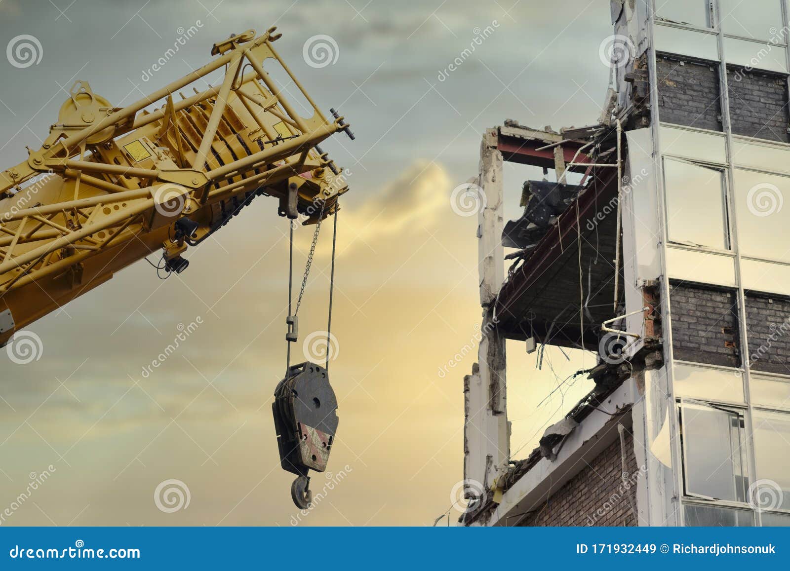 Crane Lifting Hook at Construction Site with Derelict Building for ...